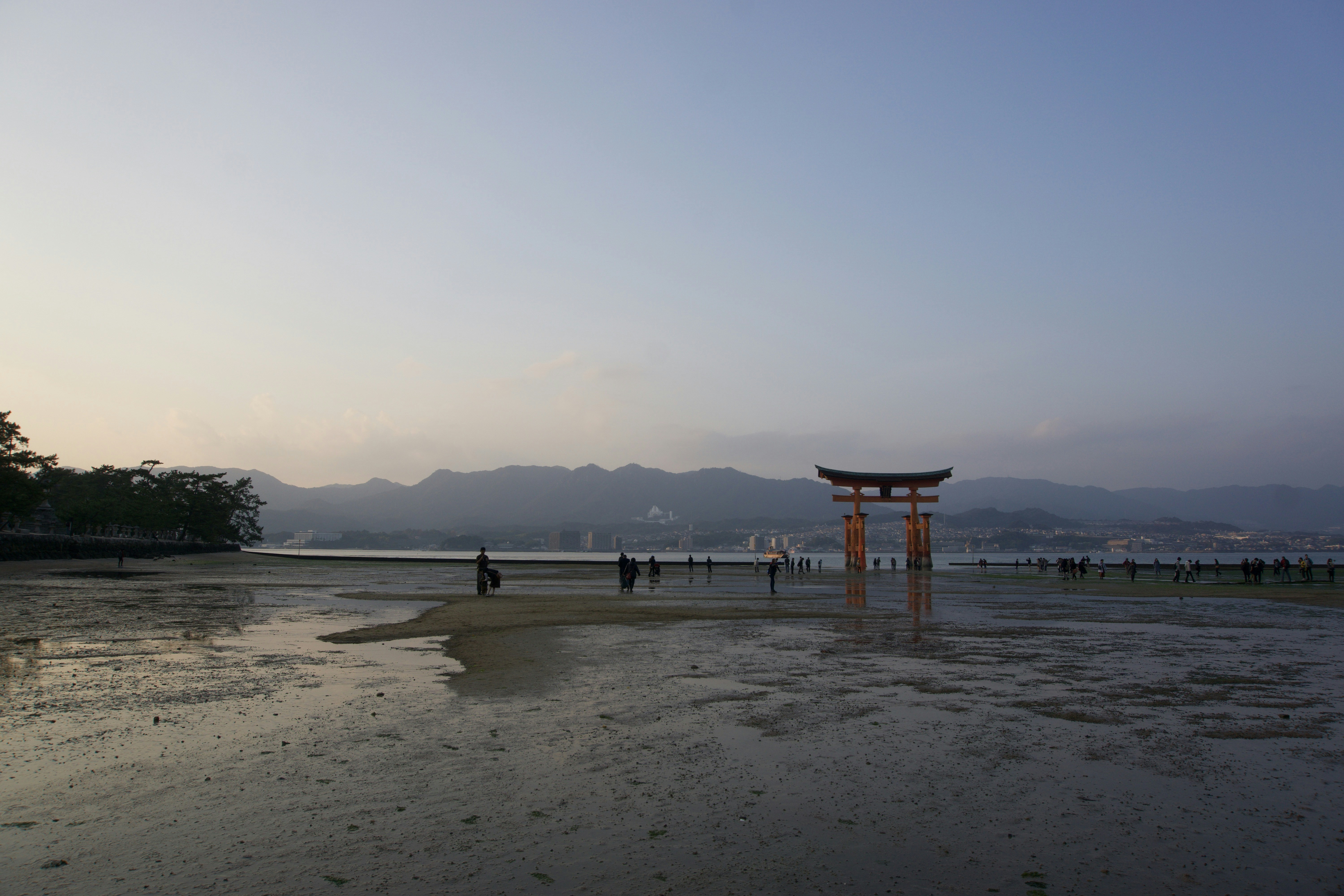 Itsukushima Torii Gate Emerging from a Calm Tidal Mirror at Dusk