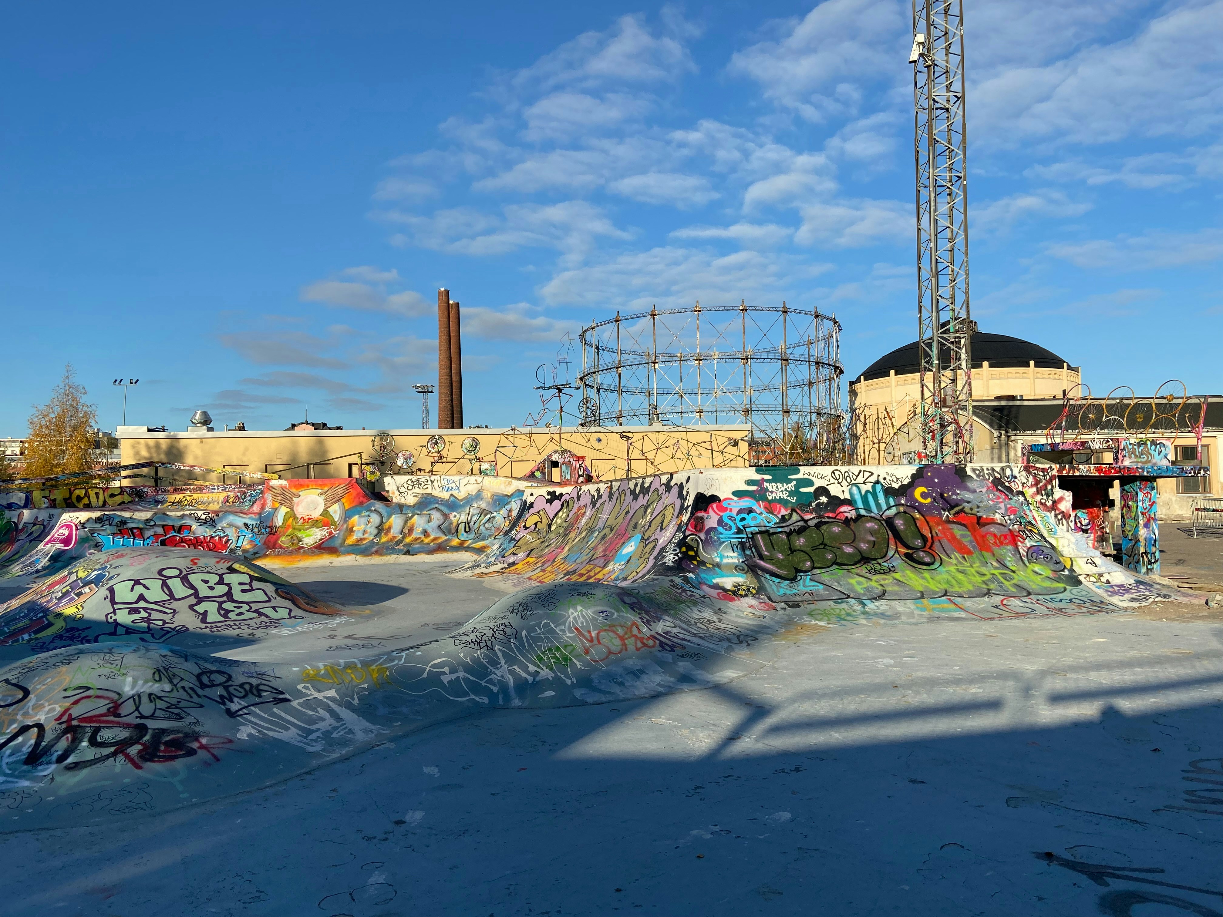 Chromatic Echoes in a Graffiti Skatepark on a Bright Day