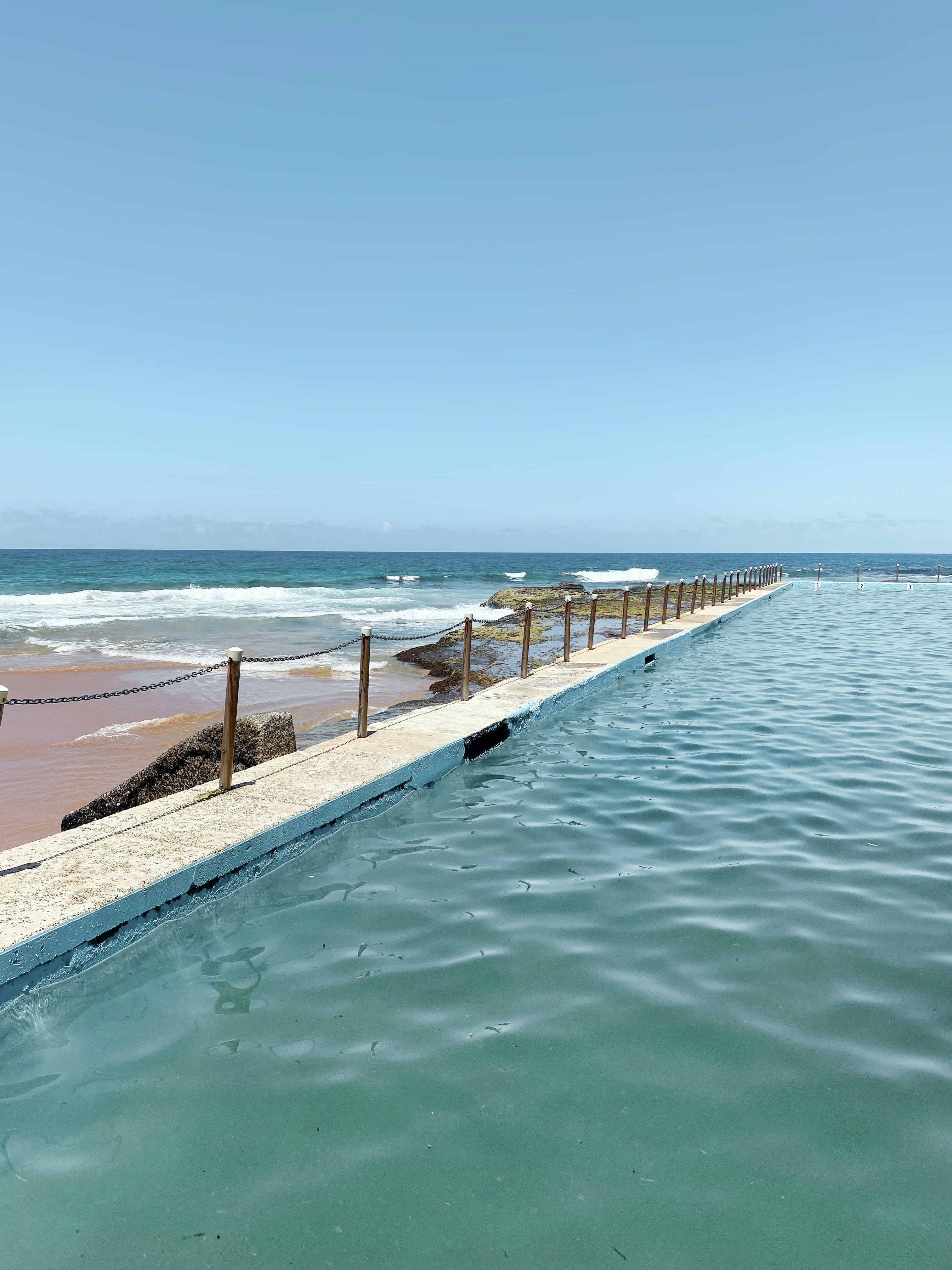 An empty swimming pool in front of the ocean photo – Free Sydney ...