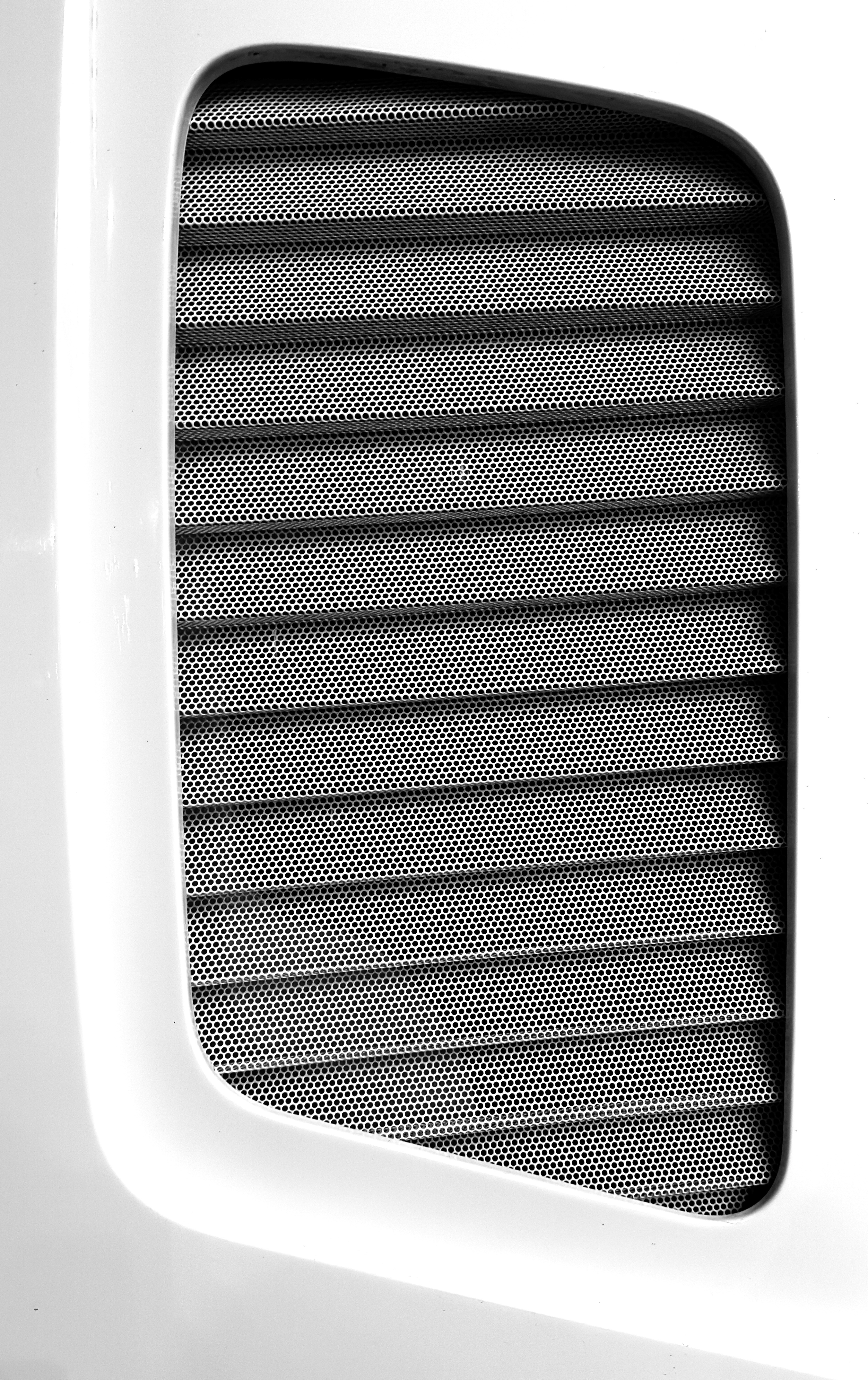 a close up of a white microwave oven