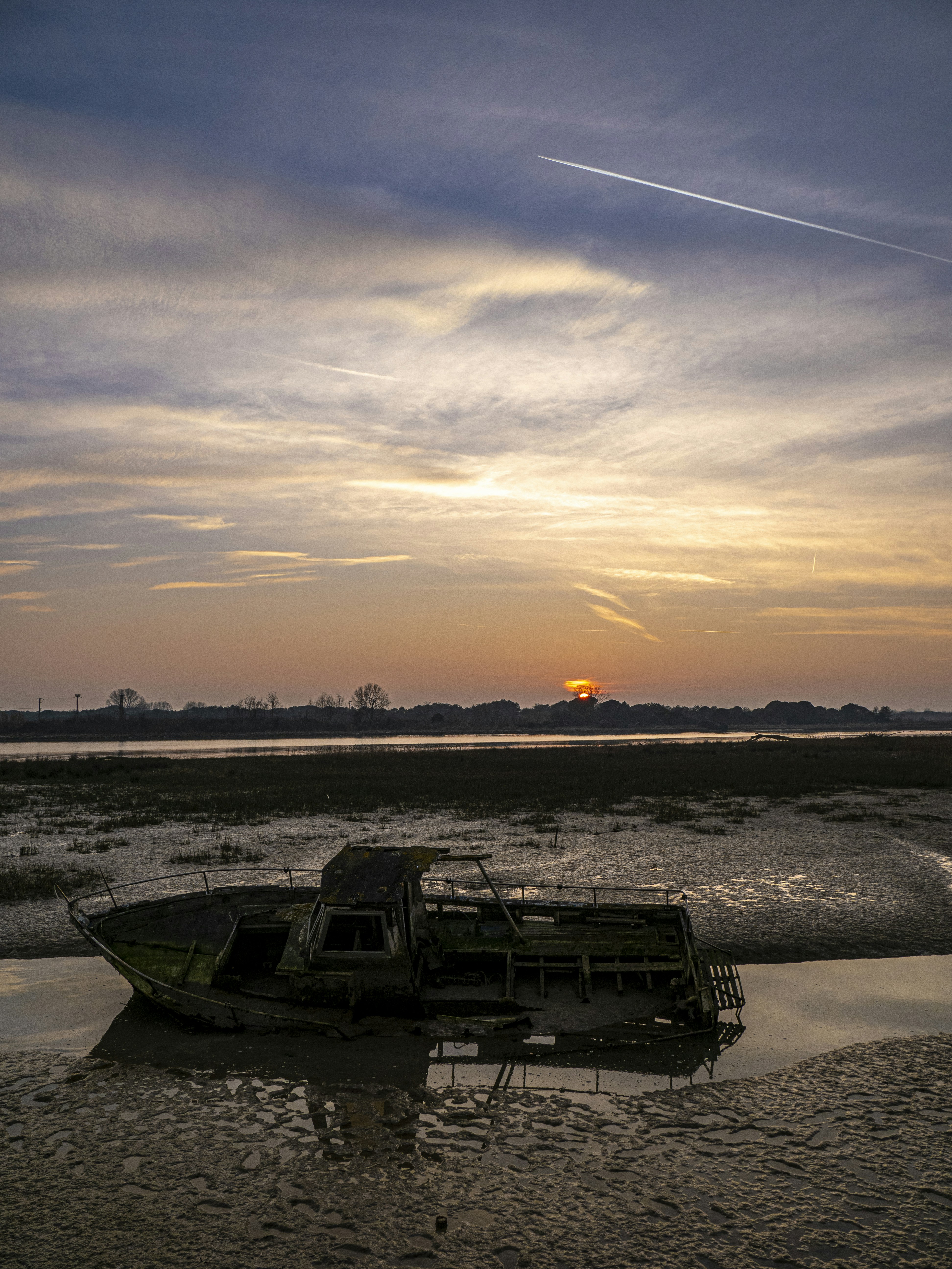 Sunset Over the Solitary Vessel