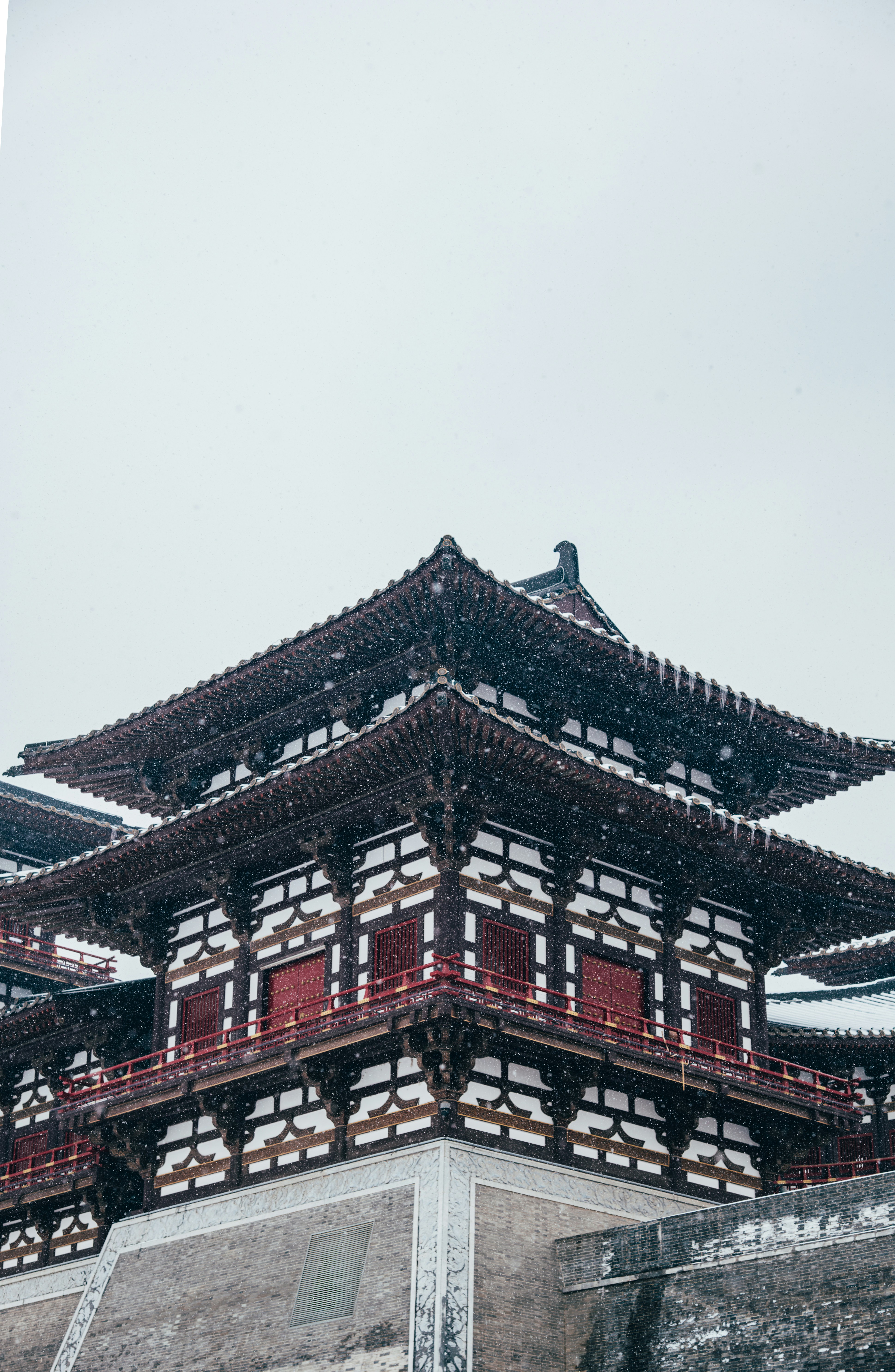 Tiered Rooftop Echoes: Snowy Pavilion Crown