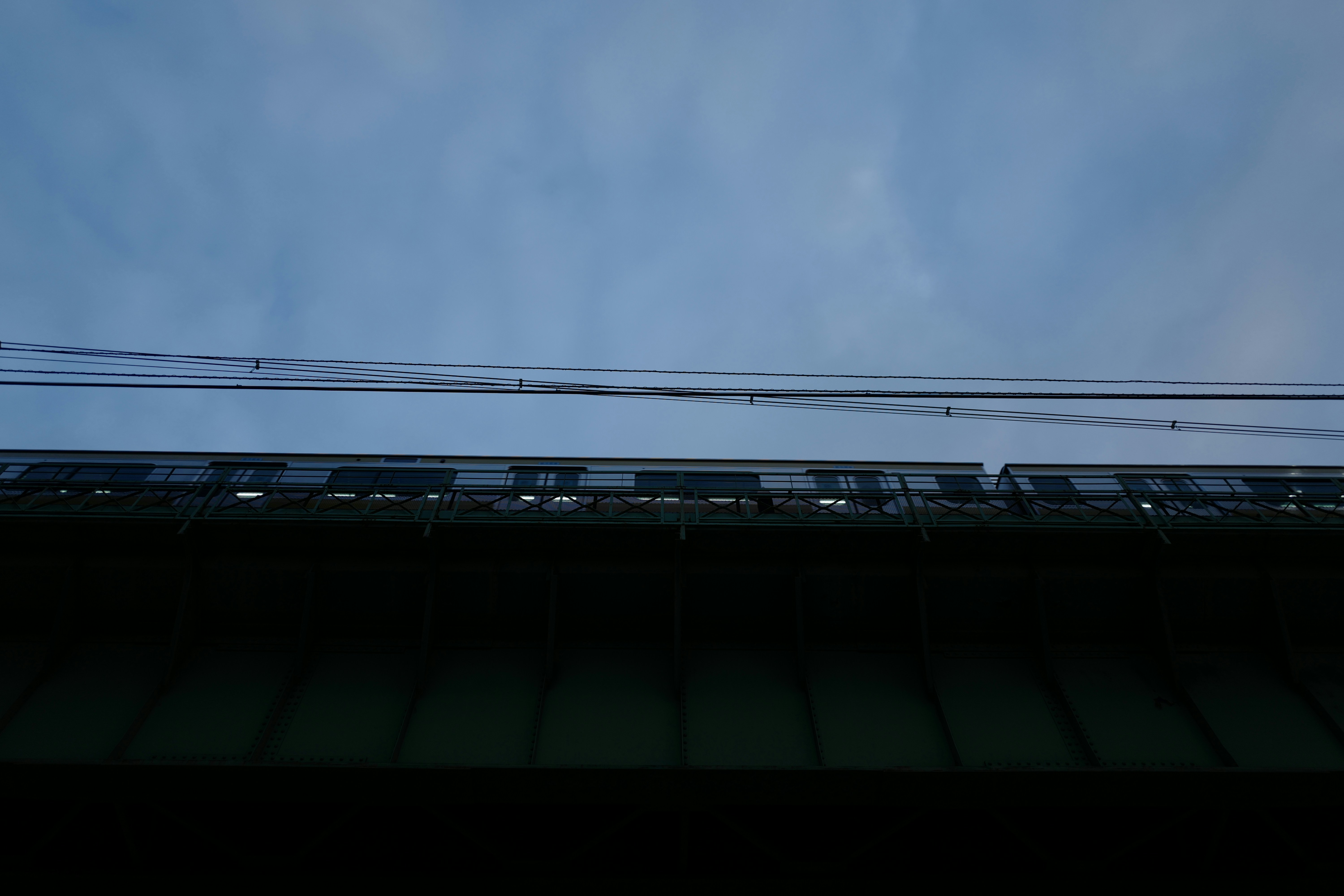 Under the Rail: A Minimal Moment of Sky and Structure