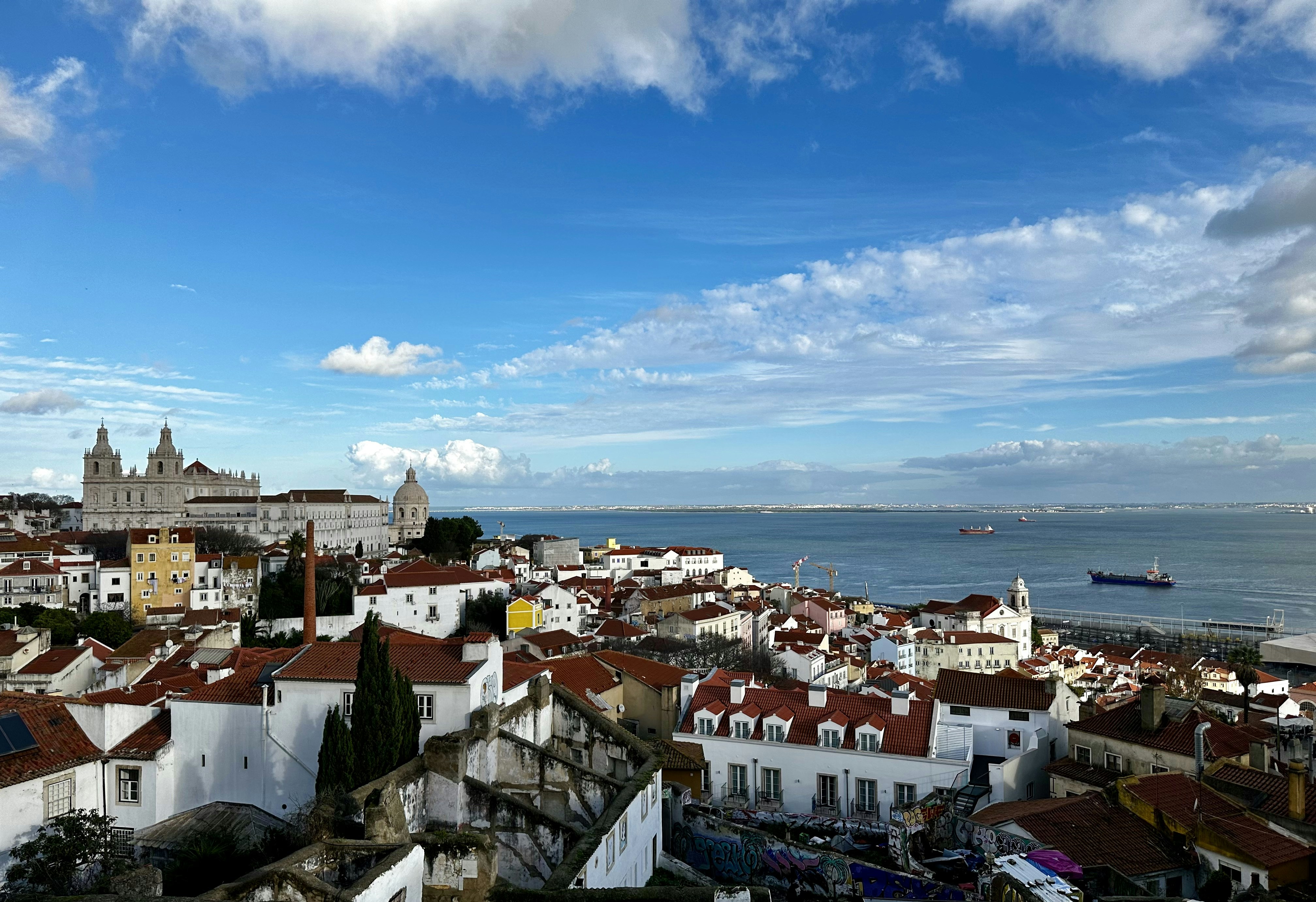 Whitewashed rooftops and Atlantic horizon