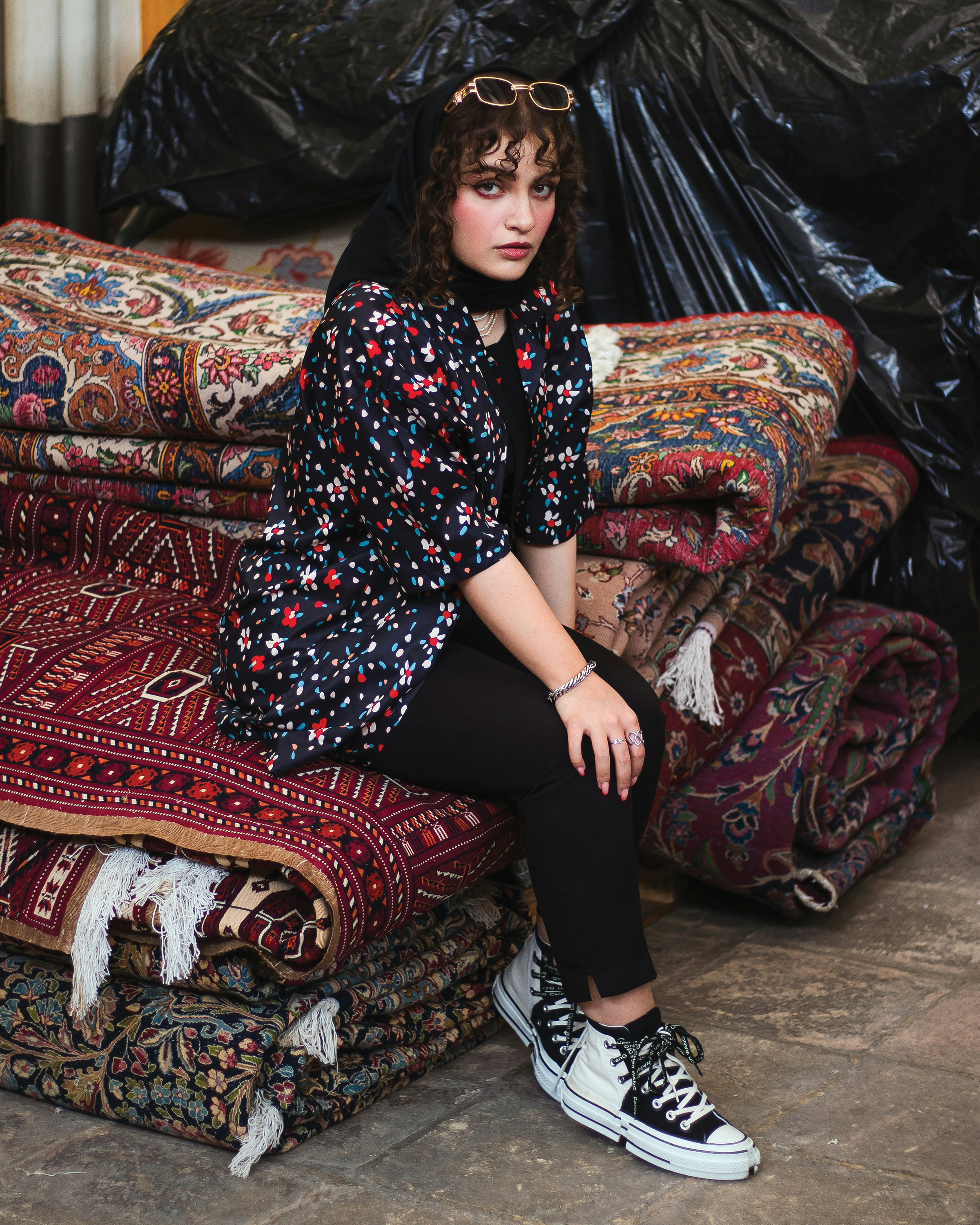 Quiet Confidence: A Portrait Amidst Vintage Textiles