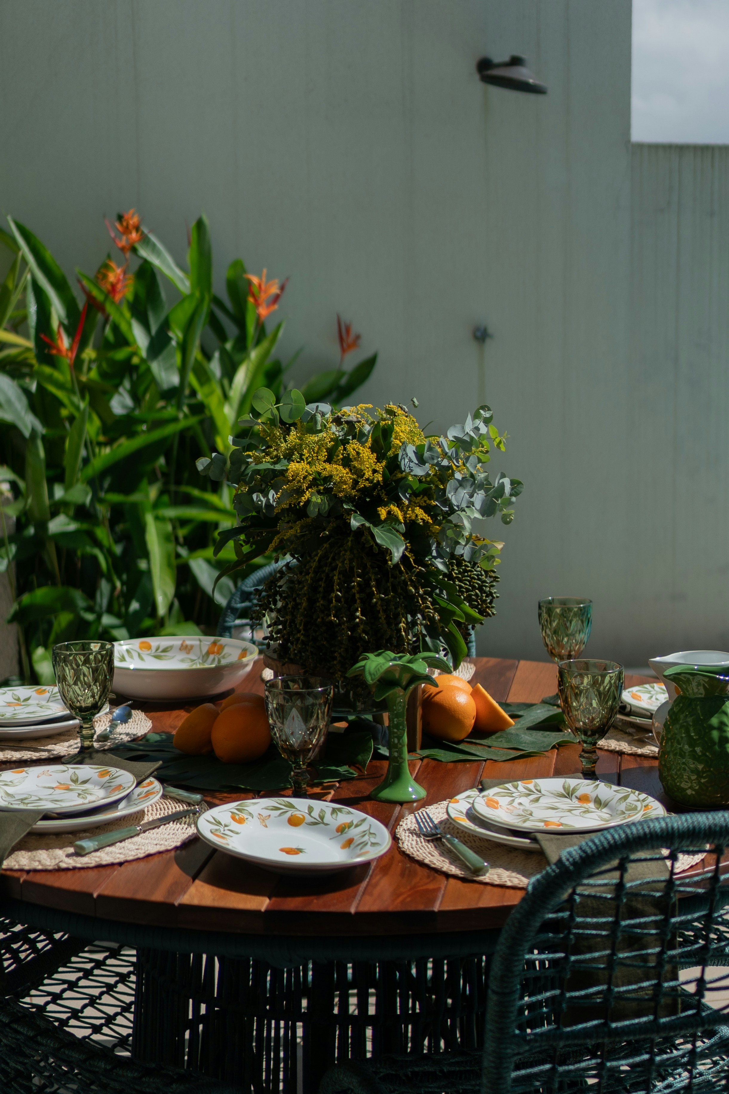 A wooden table topped with plates and bowls photo – Free Dining table ...