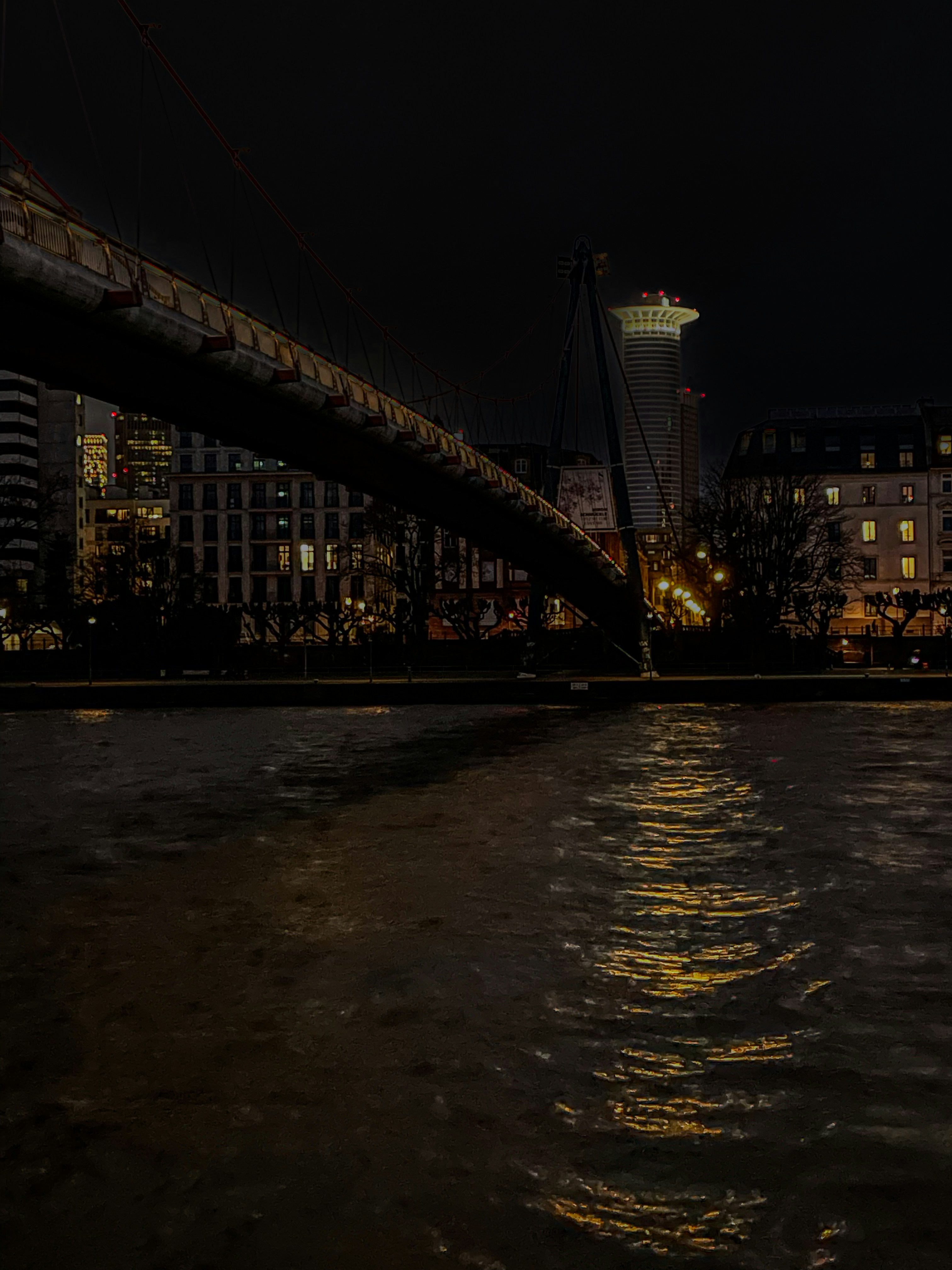 Night Water and Bridge Lights Over a Quiet City River