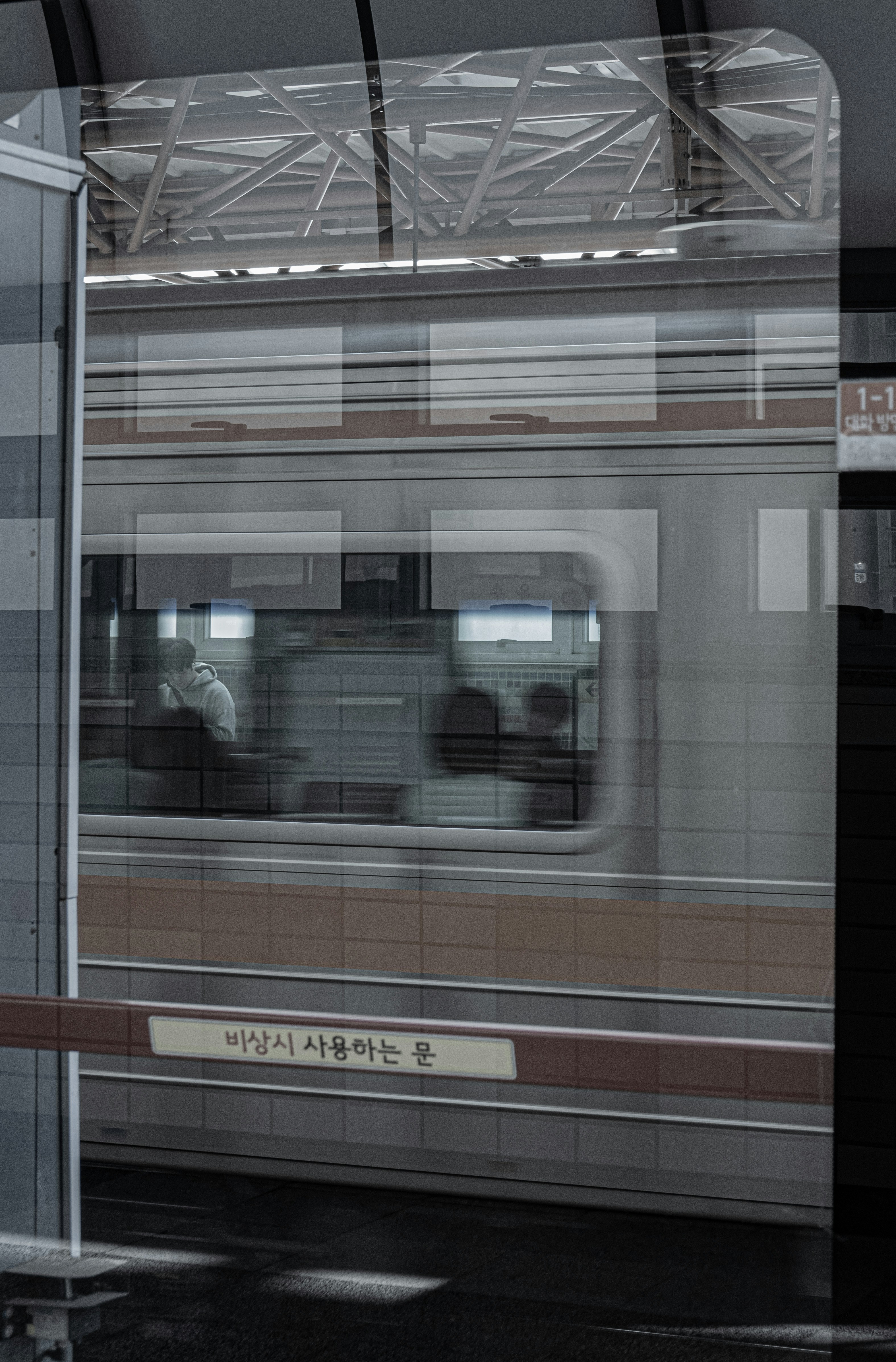 A reflection of a subway train in a window photo – Free Seoul Image on ...
