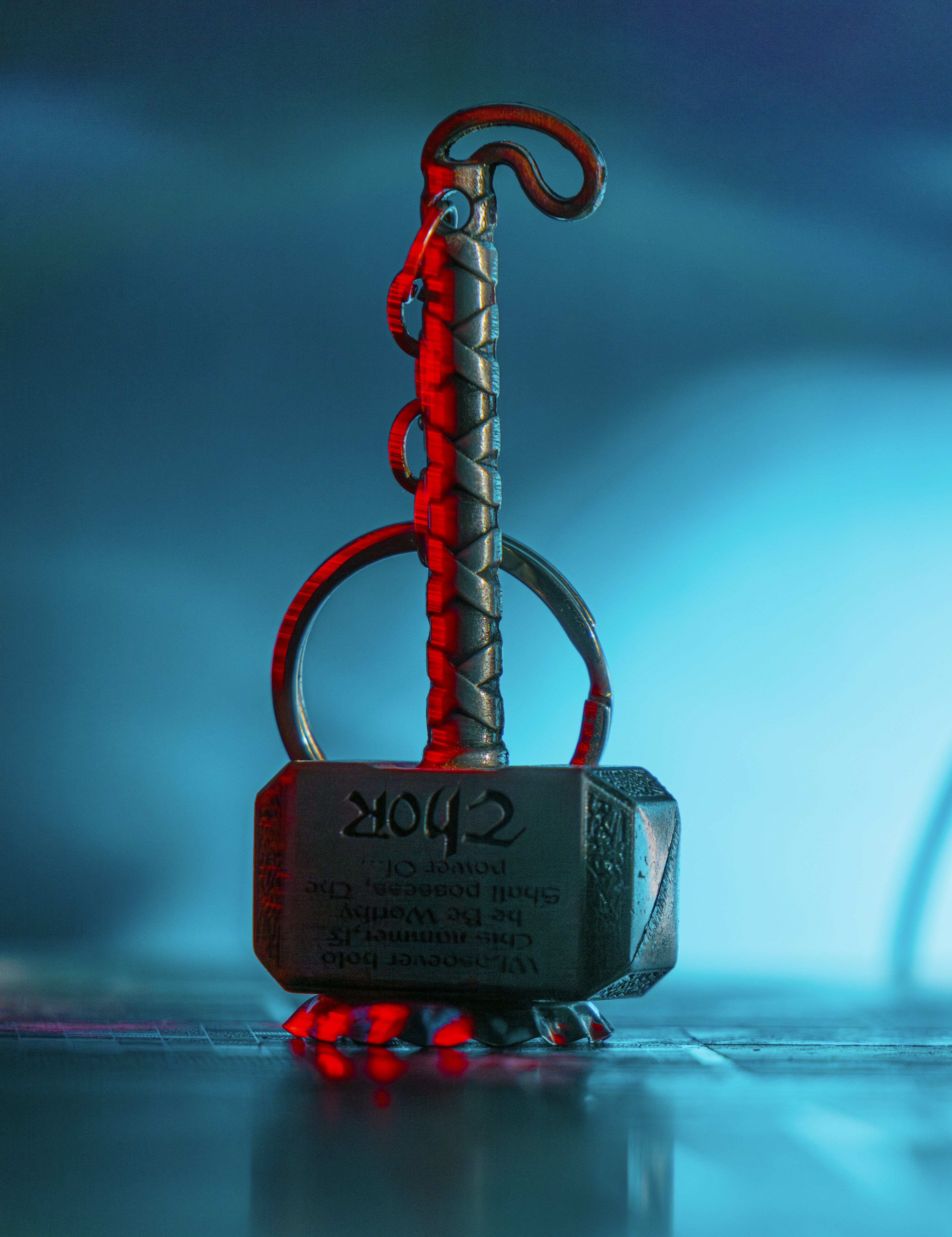 Crimson Tether Under Neon: A Close-Up of Steel and Rope