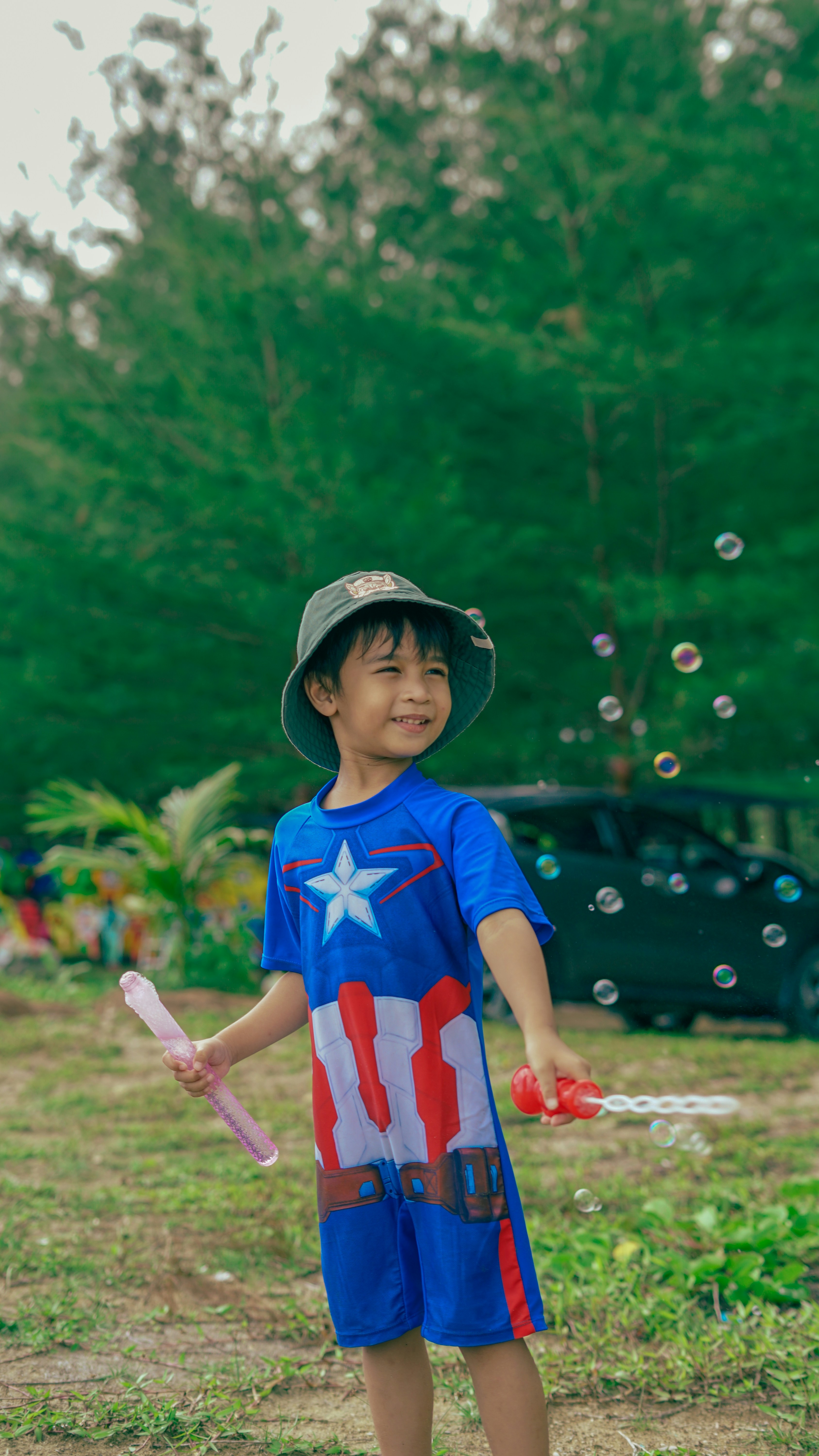 A kid Playing a Bubble