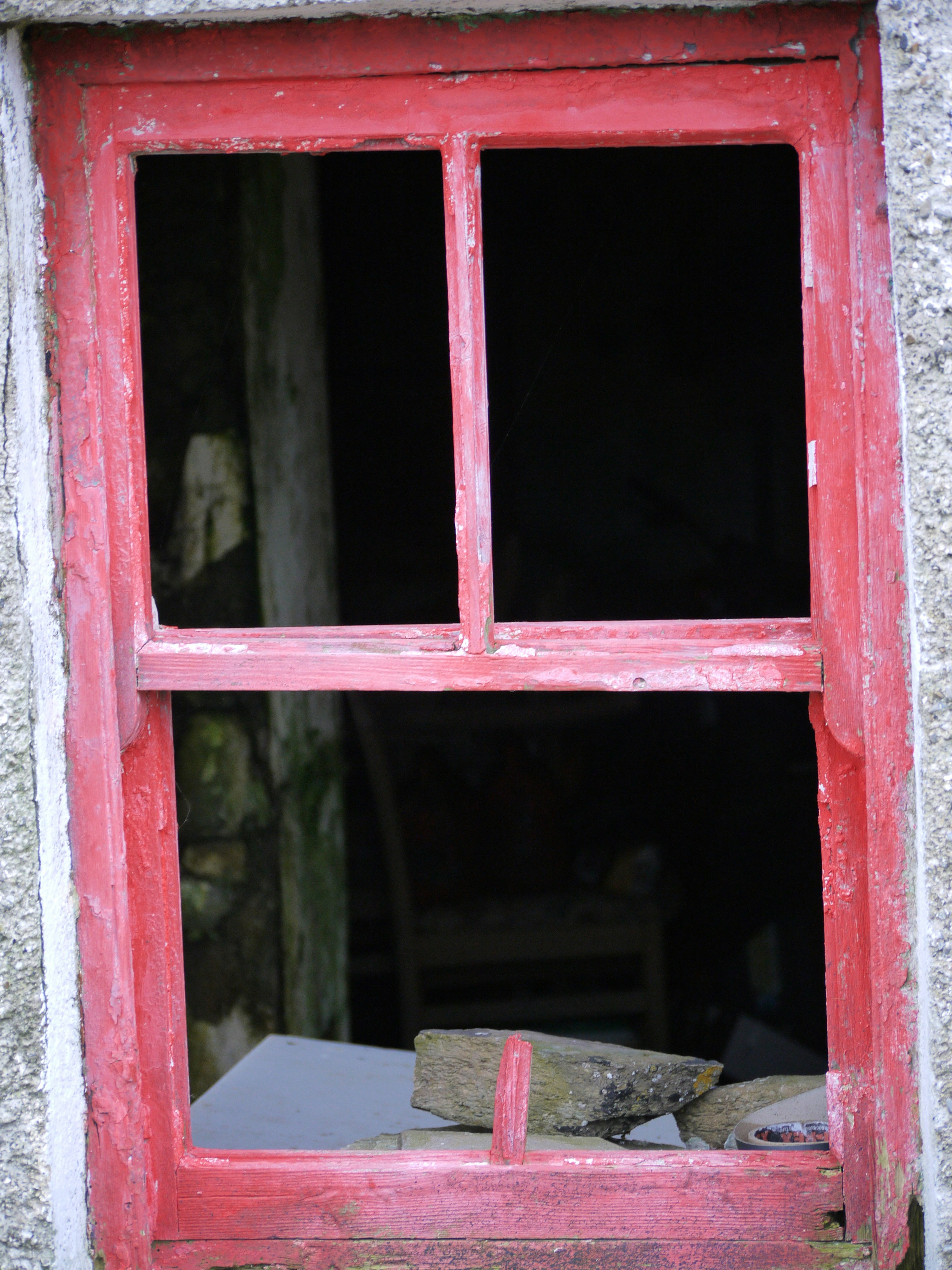 A red window with a stack of logs in it photo – Free Aughris head Image ...