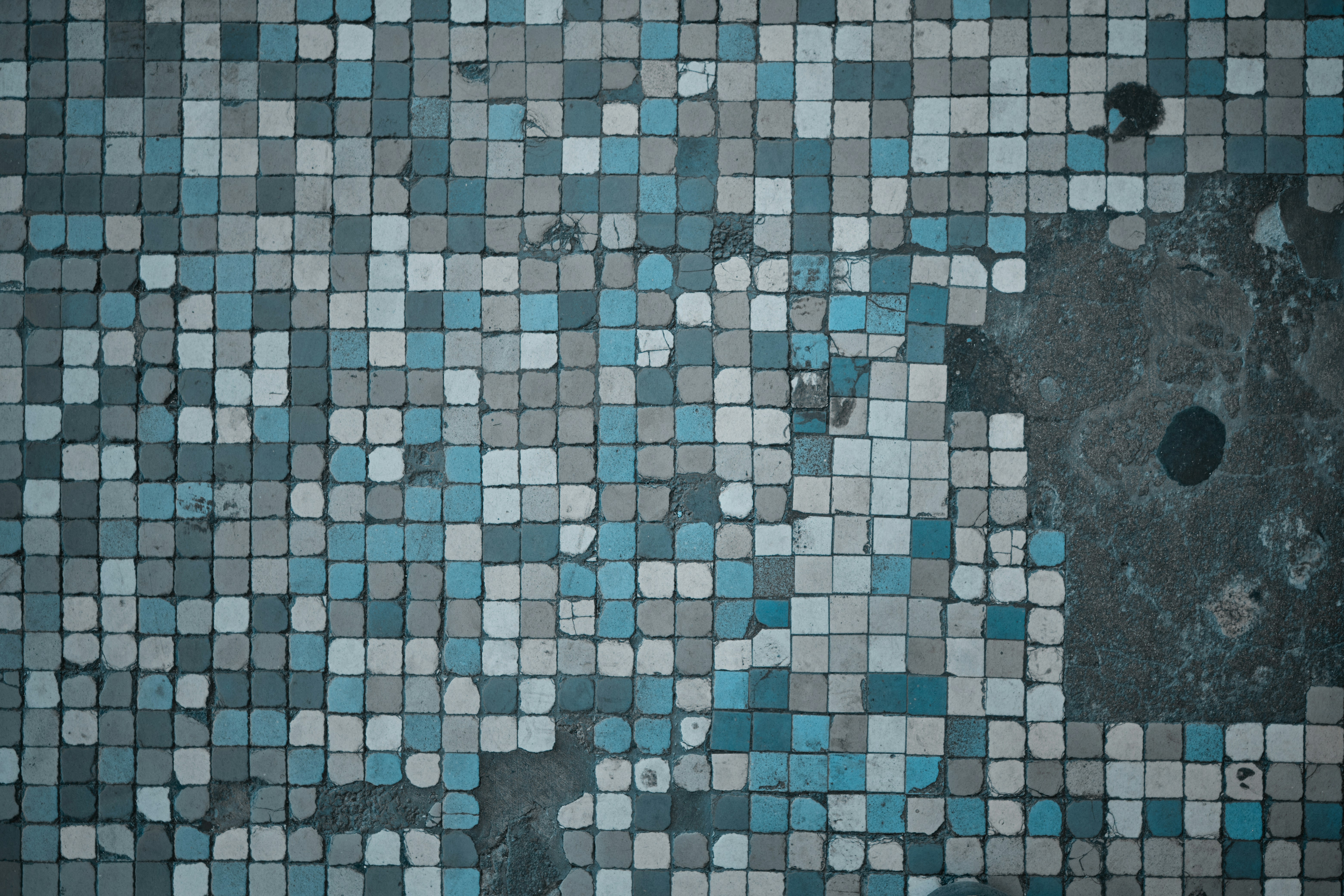 Blue Mosaic Grid: A Geometric Tapestry of Tiles and Shadows