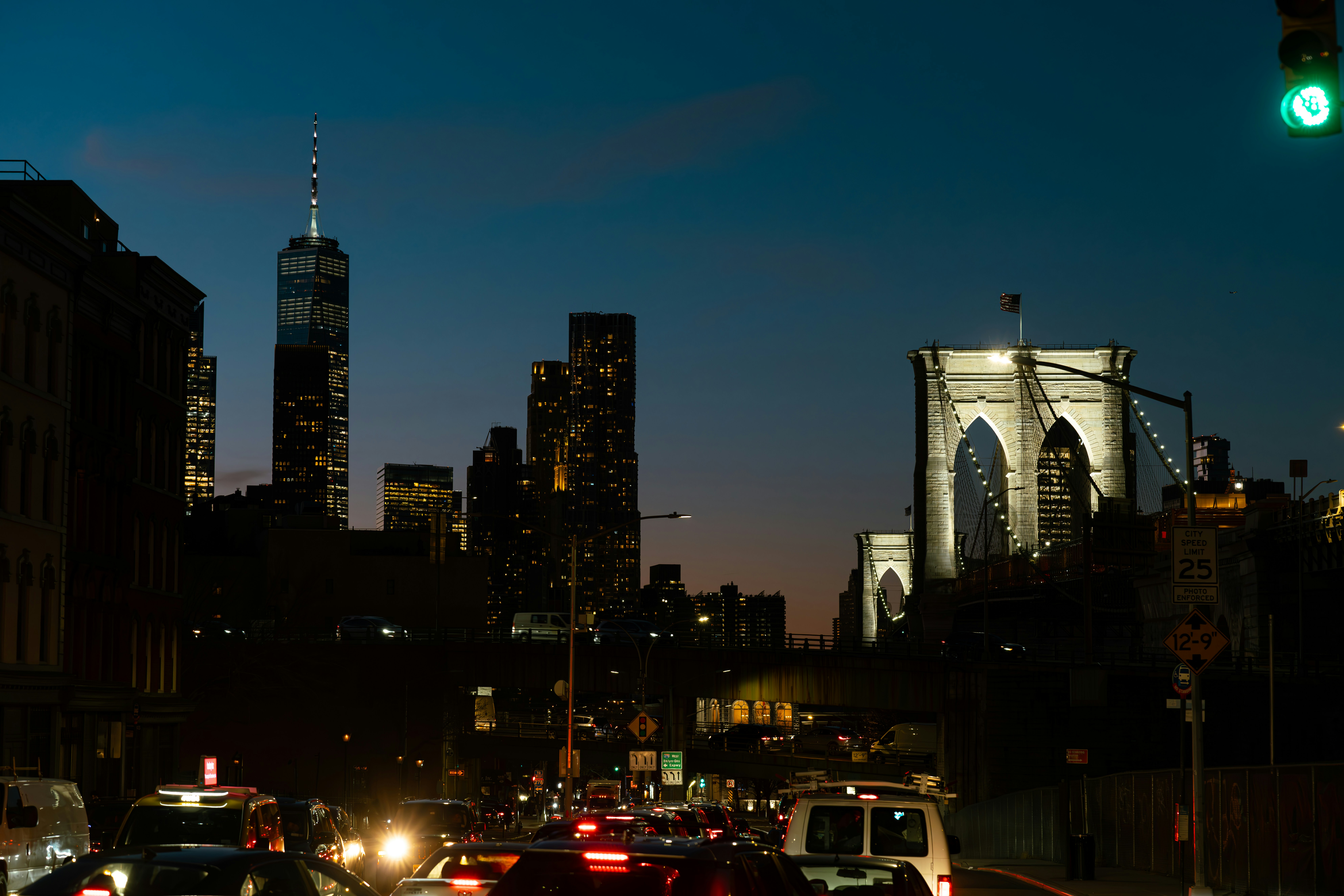 Night Bridge Glow: City Skyline Framed by Moving Tail Lights