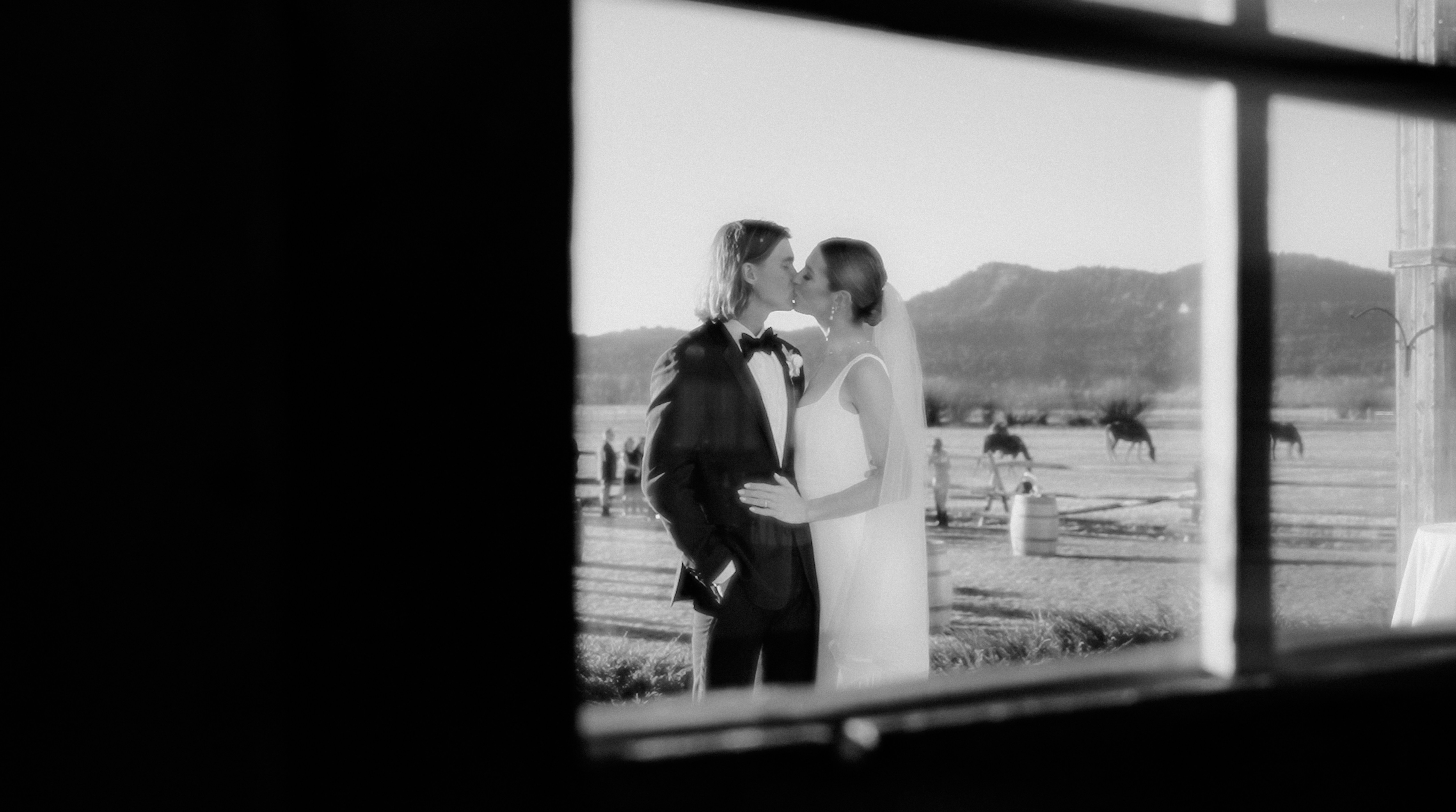 A bride and groom kissing in front of a window photo – Free Woman Image ...