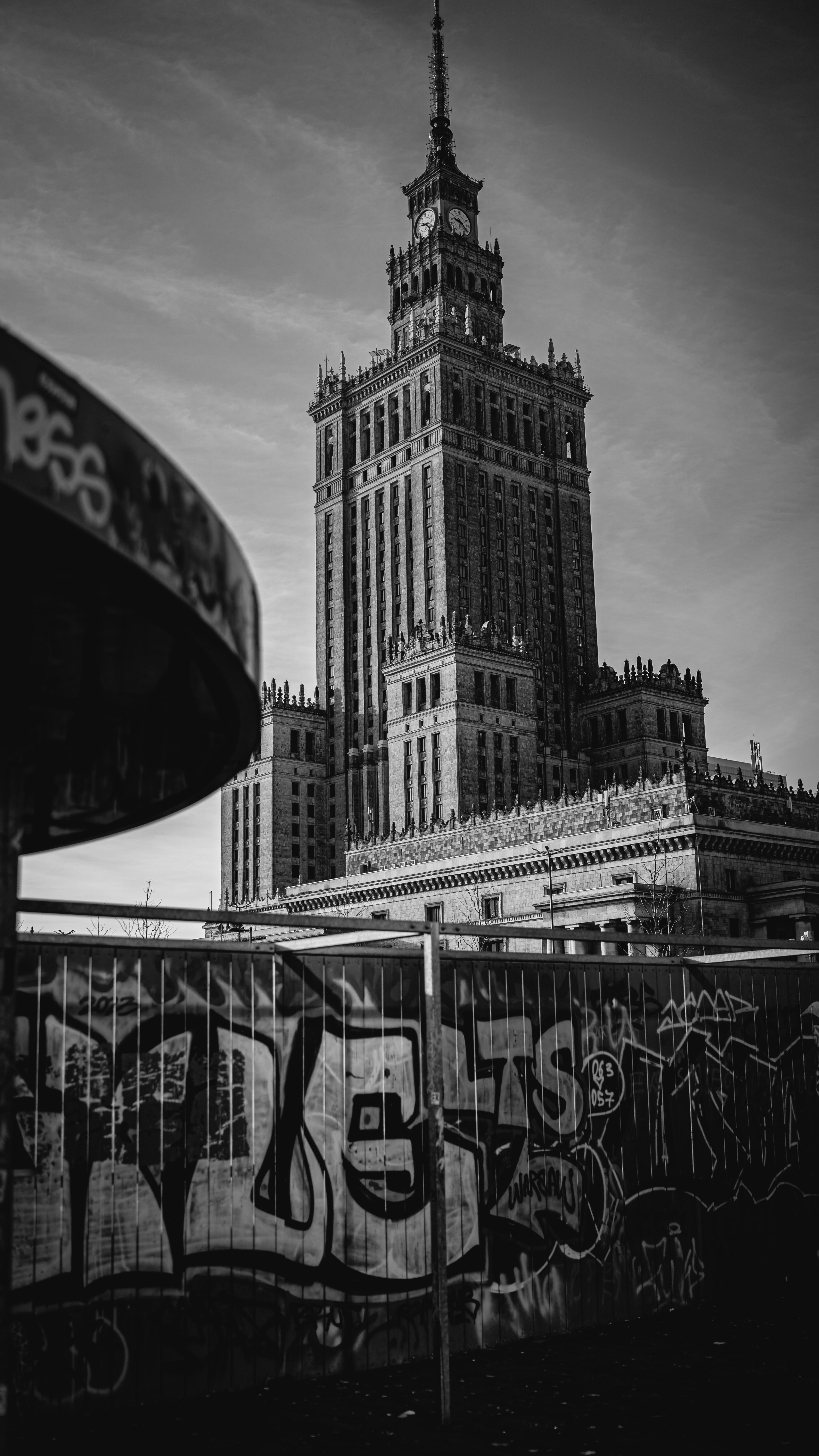 Towering Spire with Graffiti Foreground: A Mono City Portrait