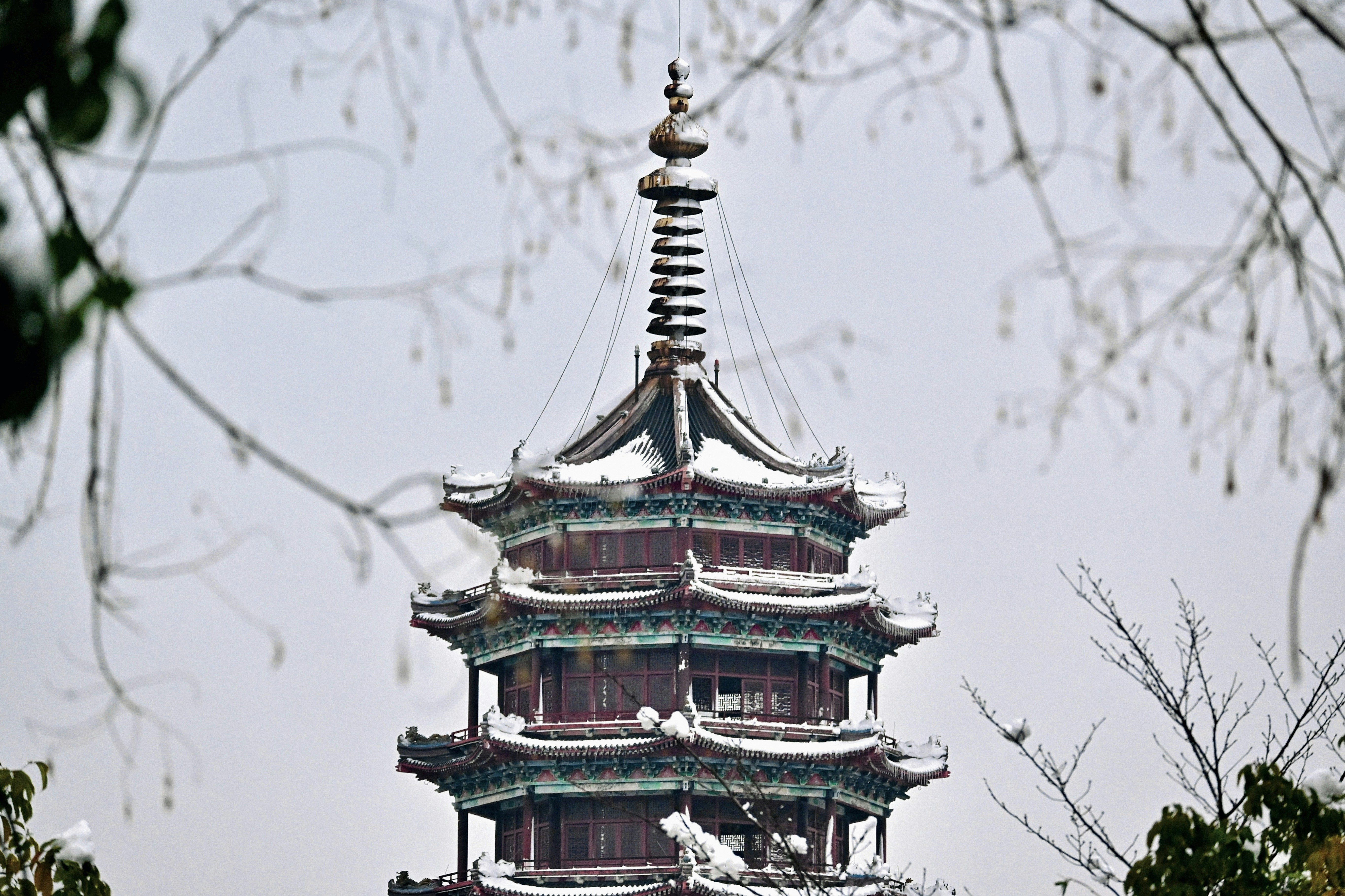Snowbound Spire: A Winter Portrait of a Multi-Tier Pagoda