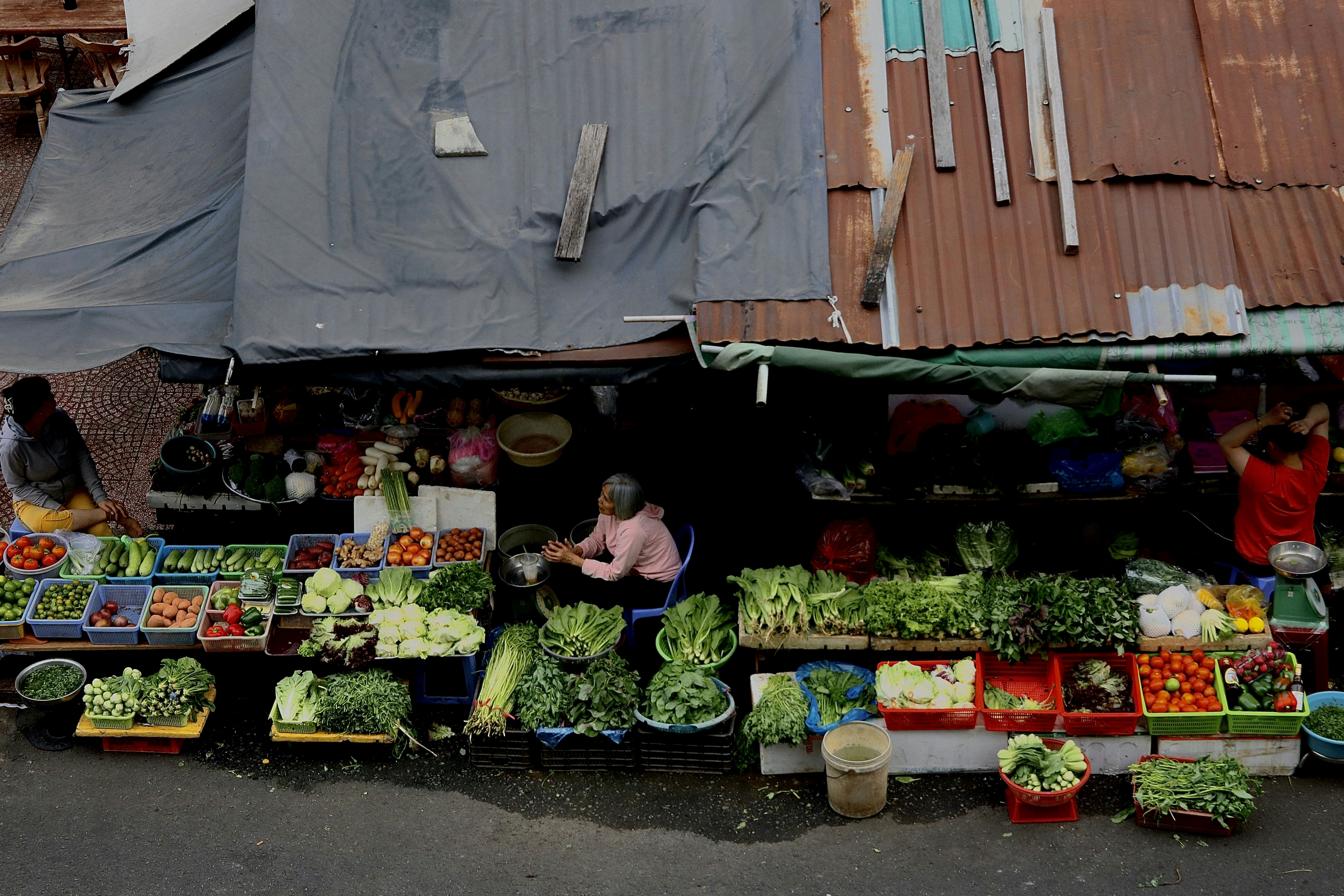 Verdant Crossroads: A Street Market's Colorful Cascade of Greens