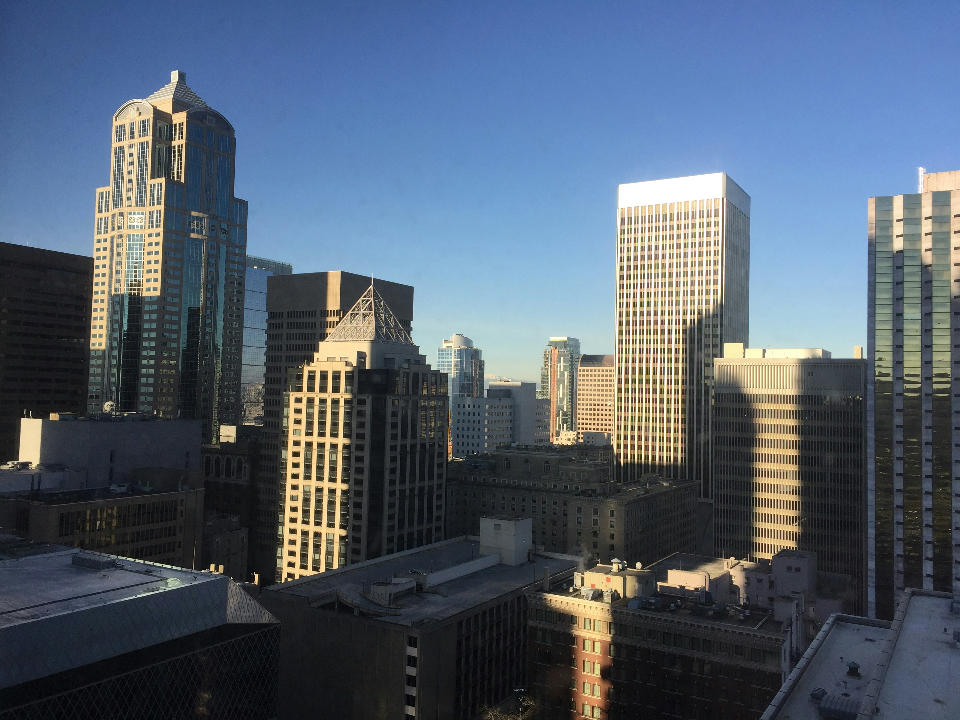A view of a city from a high rise building photo – Free City Image on ...