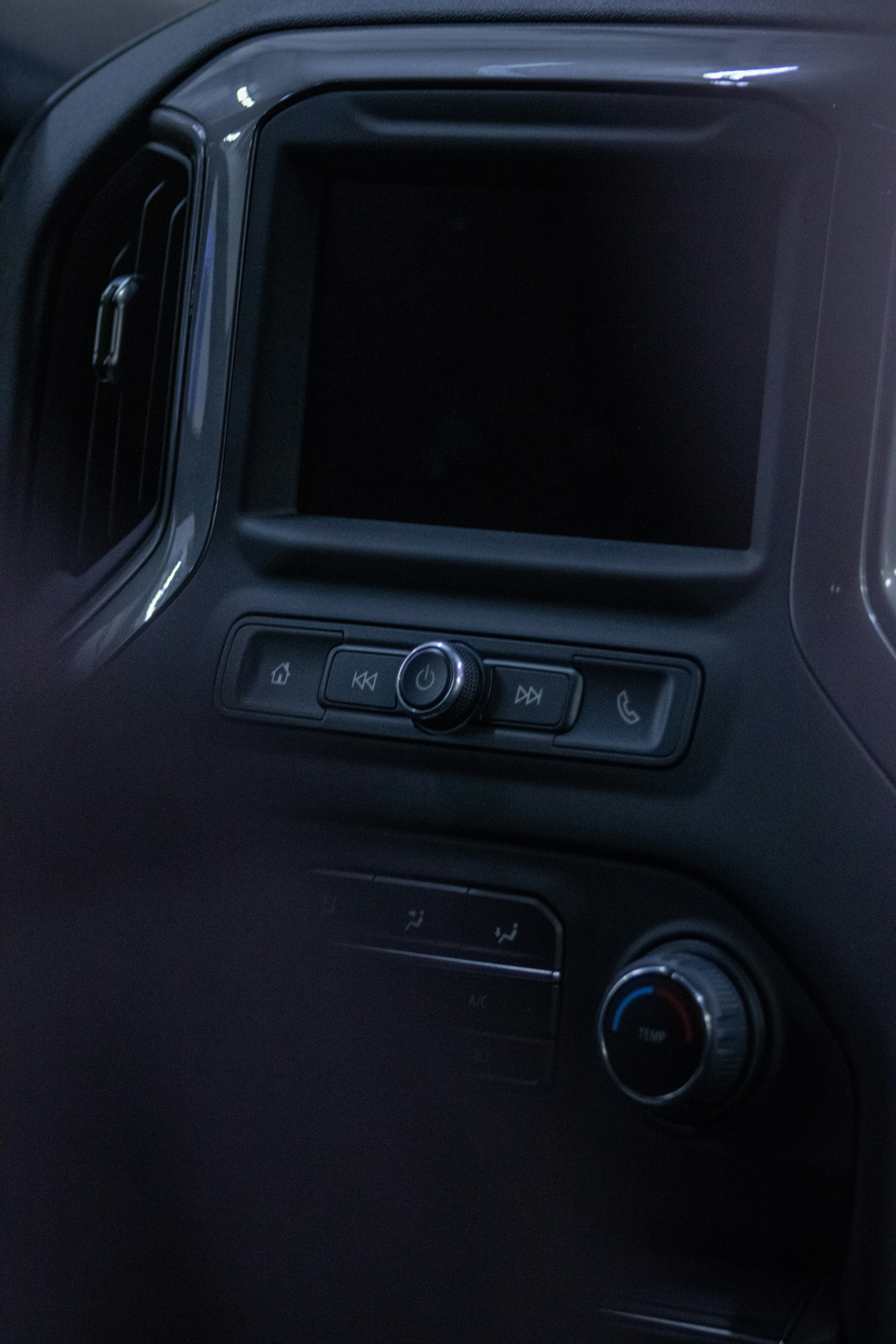 Midnight Console: A Dim Infotainment Center in a Quiet Car Cabin