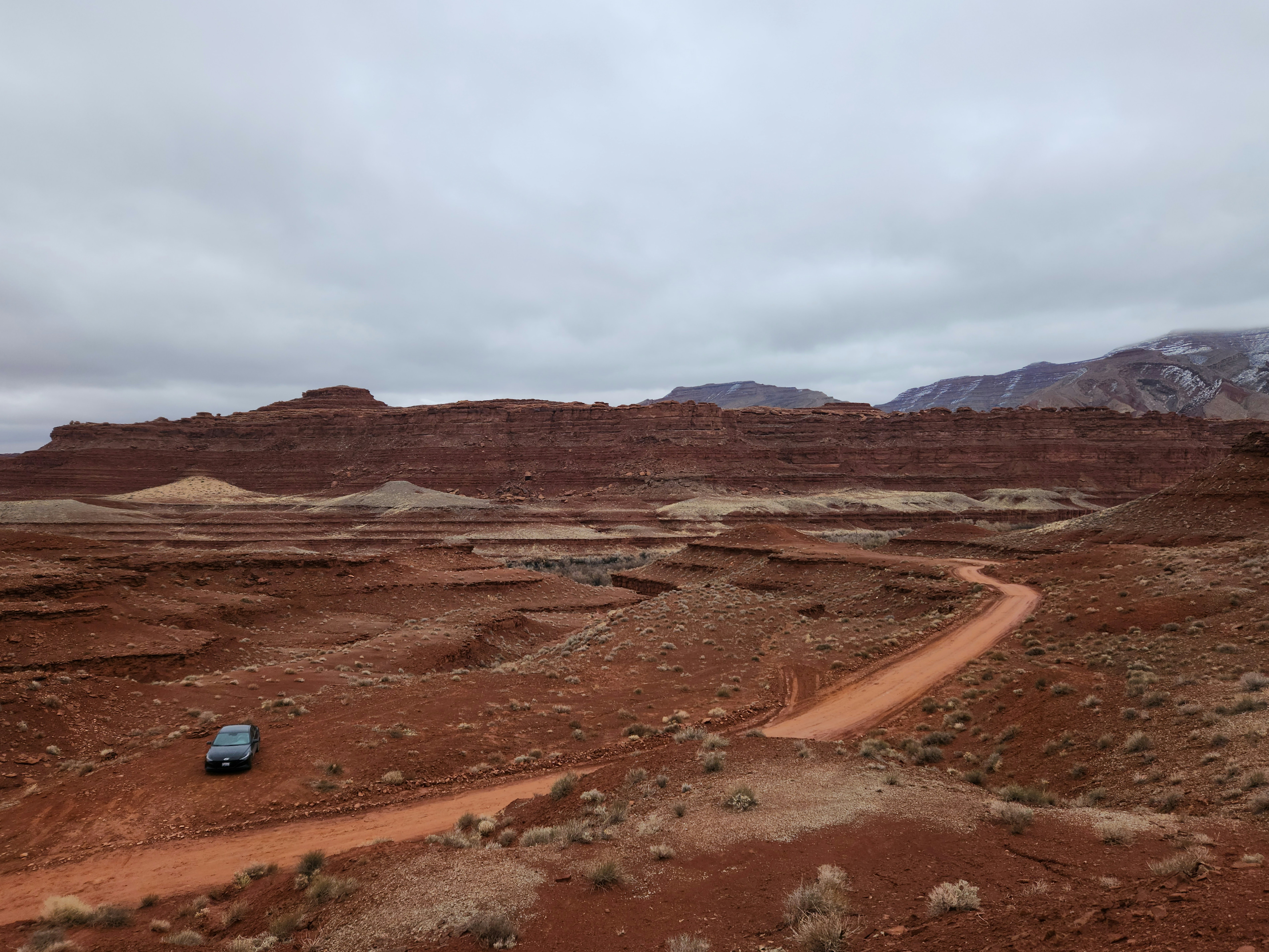 Dusty Red Trail to the Distant Rim
