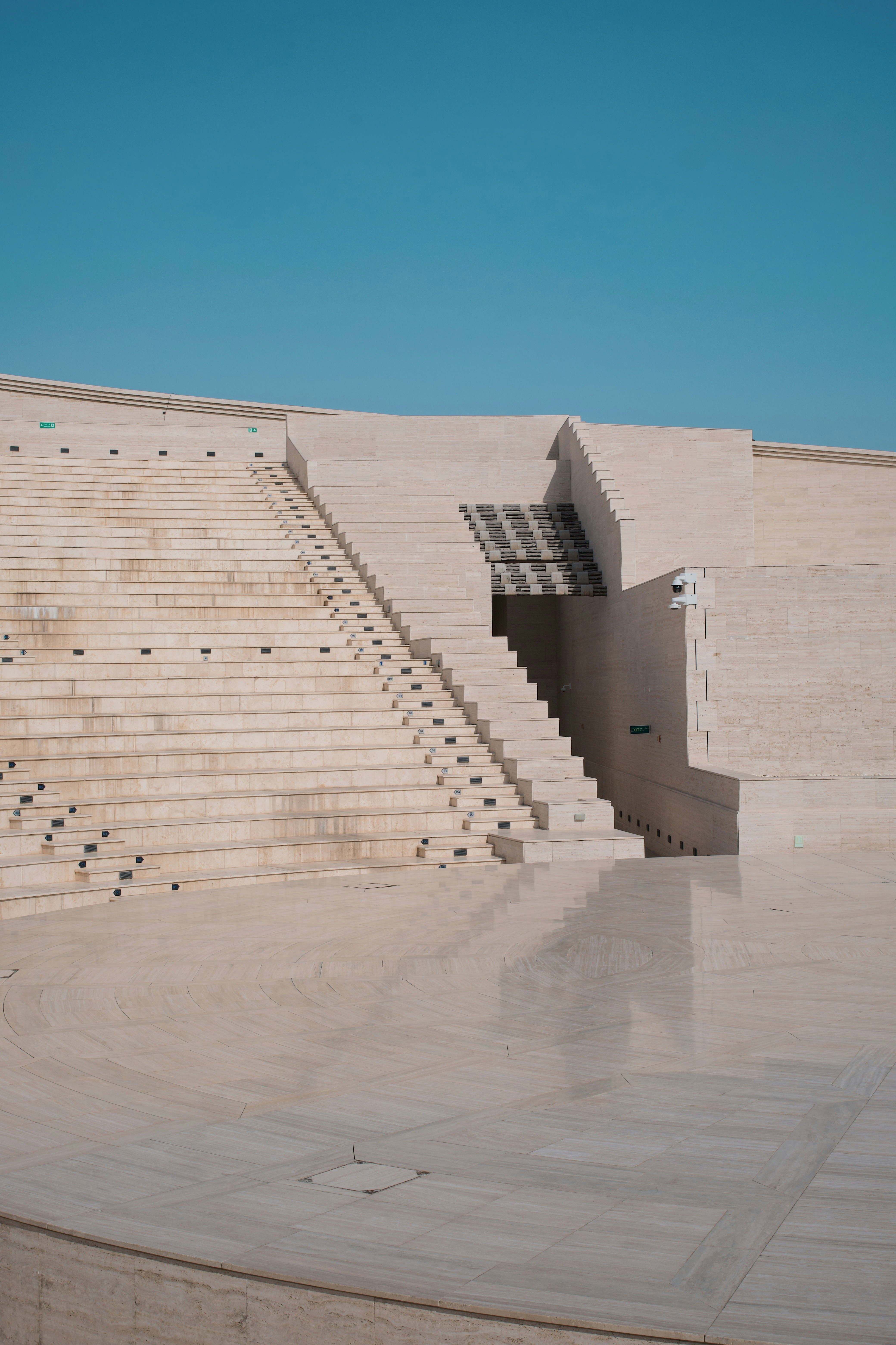 A large concrete structure with steps leading up to it photo – Free ...