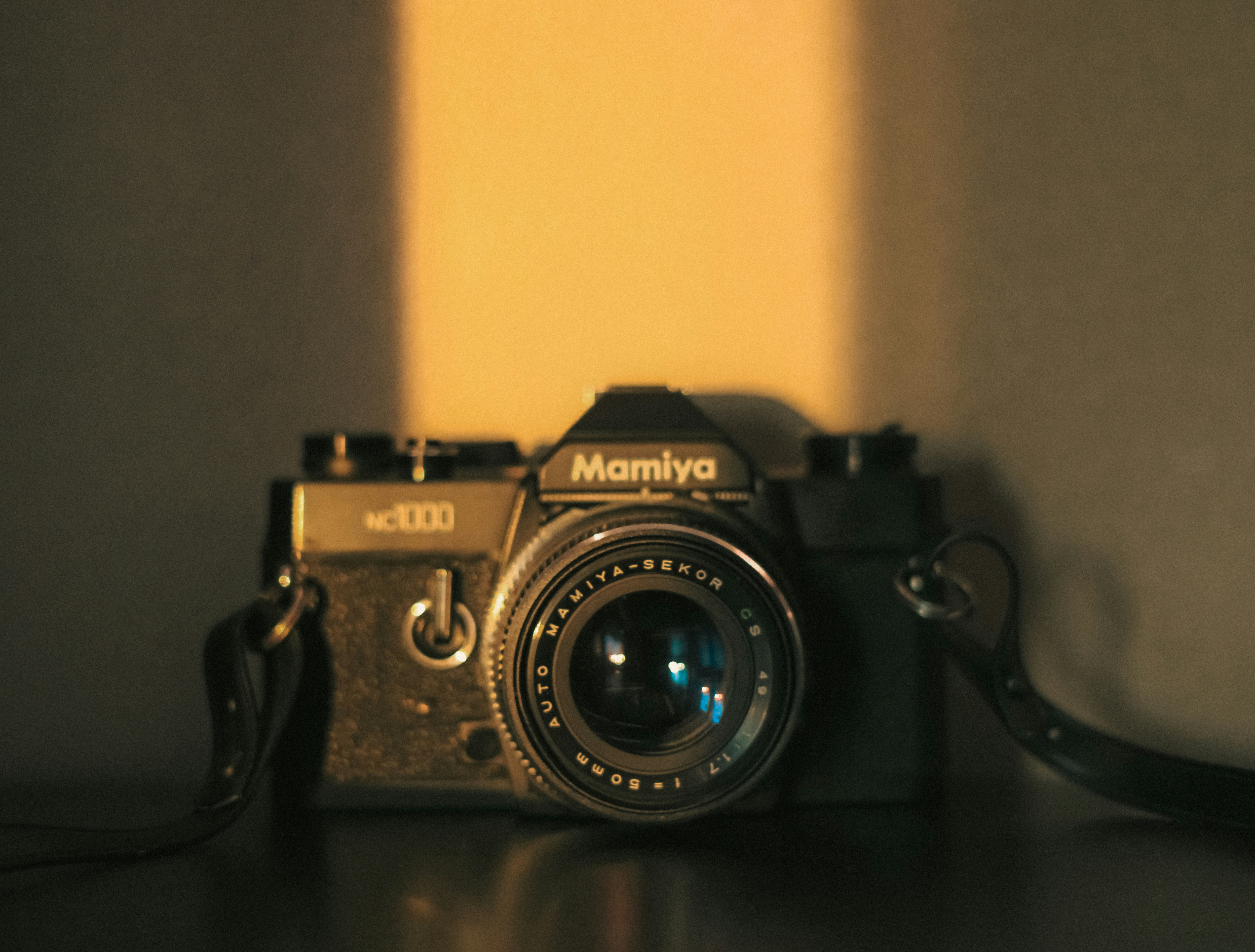 Warm Stillness: a Vintage Mamiya Camera in a Velvet Shadow