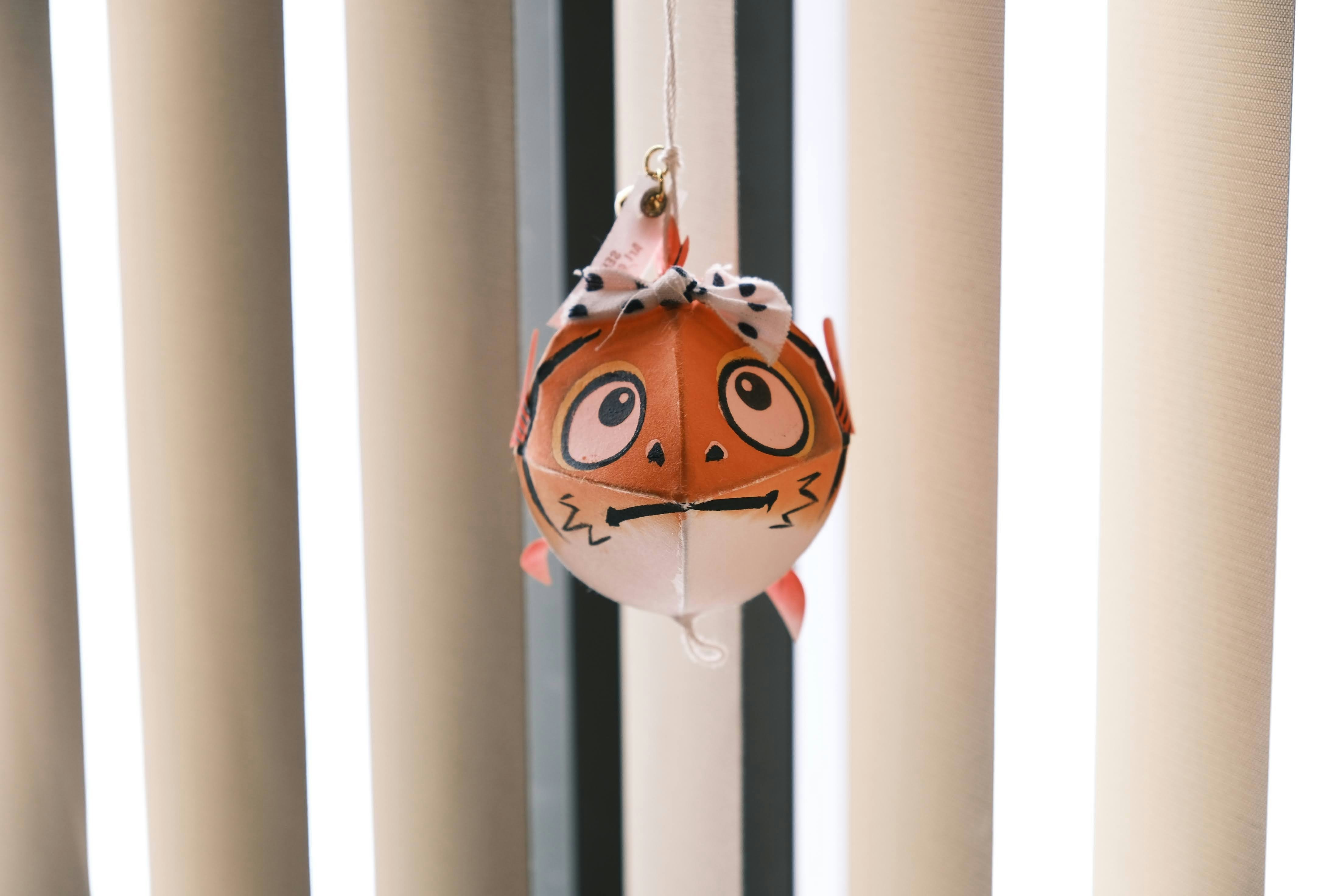 Hanging Toy Tiger: The Whimsy in Between Sunlit Slats