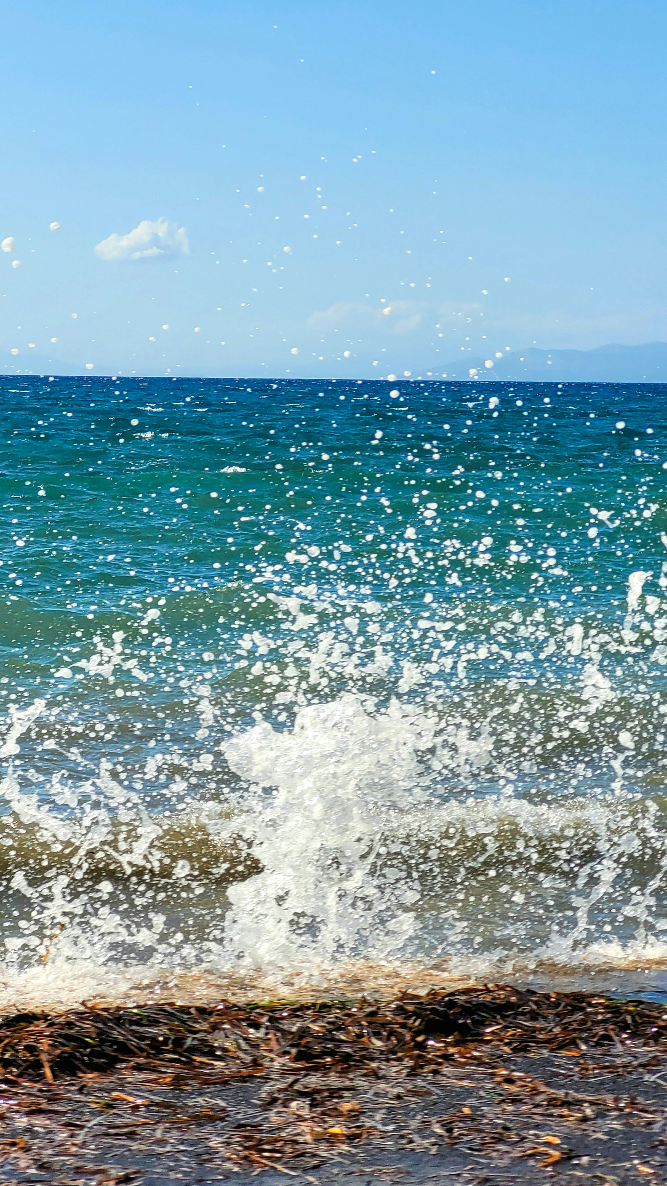 A man riding a surfboard on top of a wave photo – Free Beach Image on ...