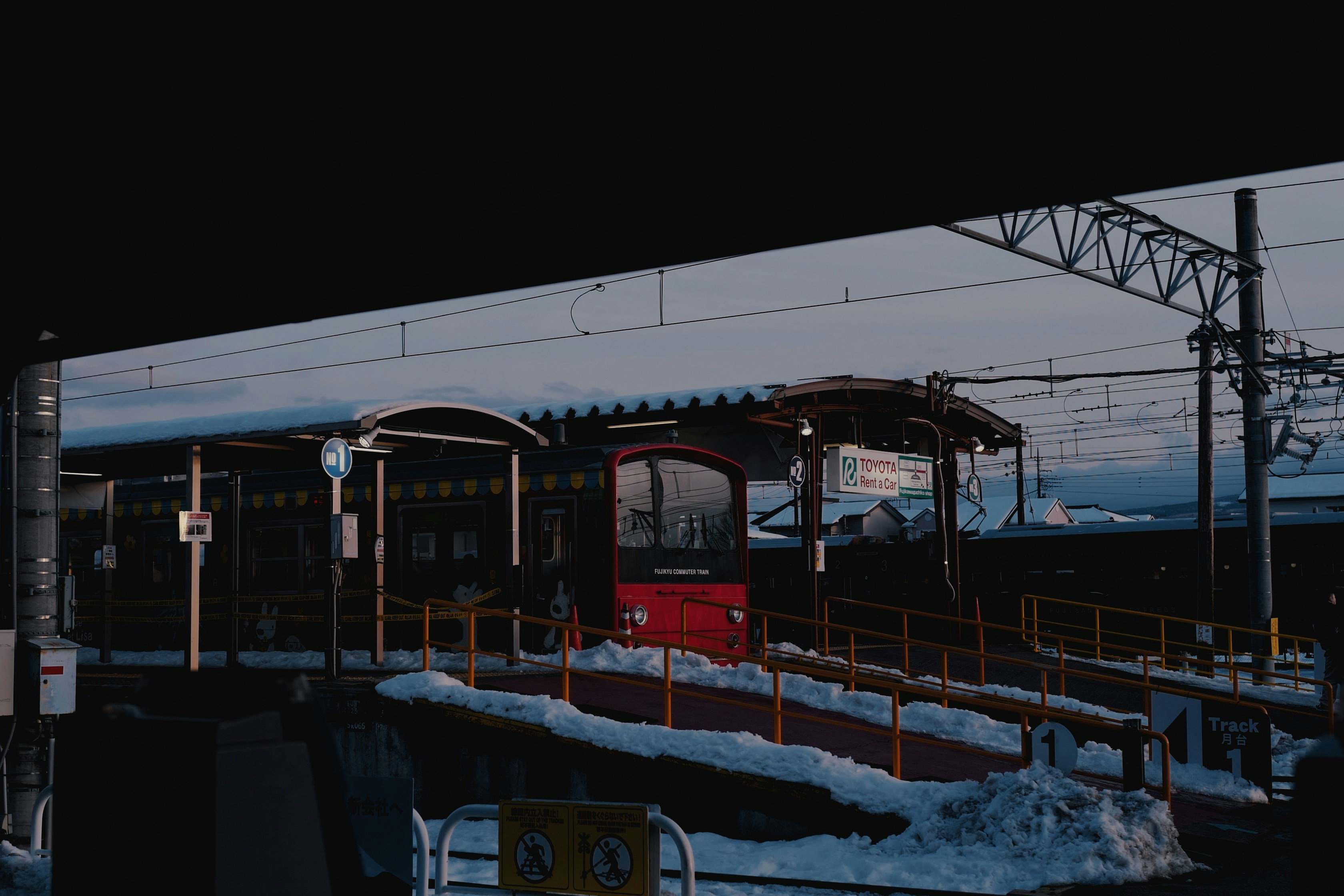 Crimson Commuter at Dusk: Snow, Steel, and Silence