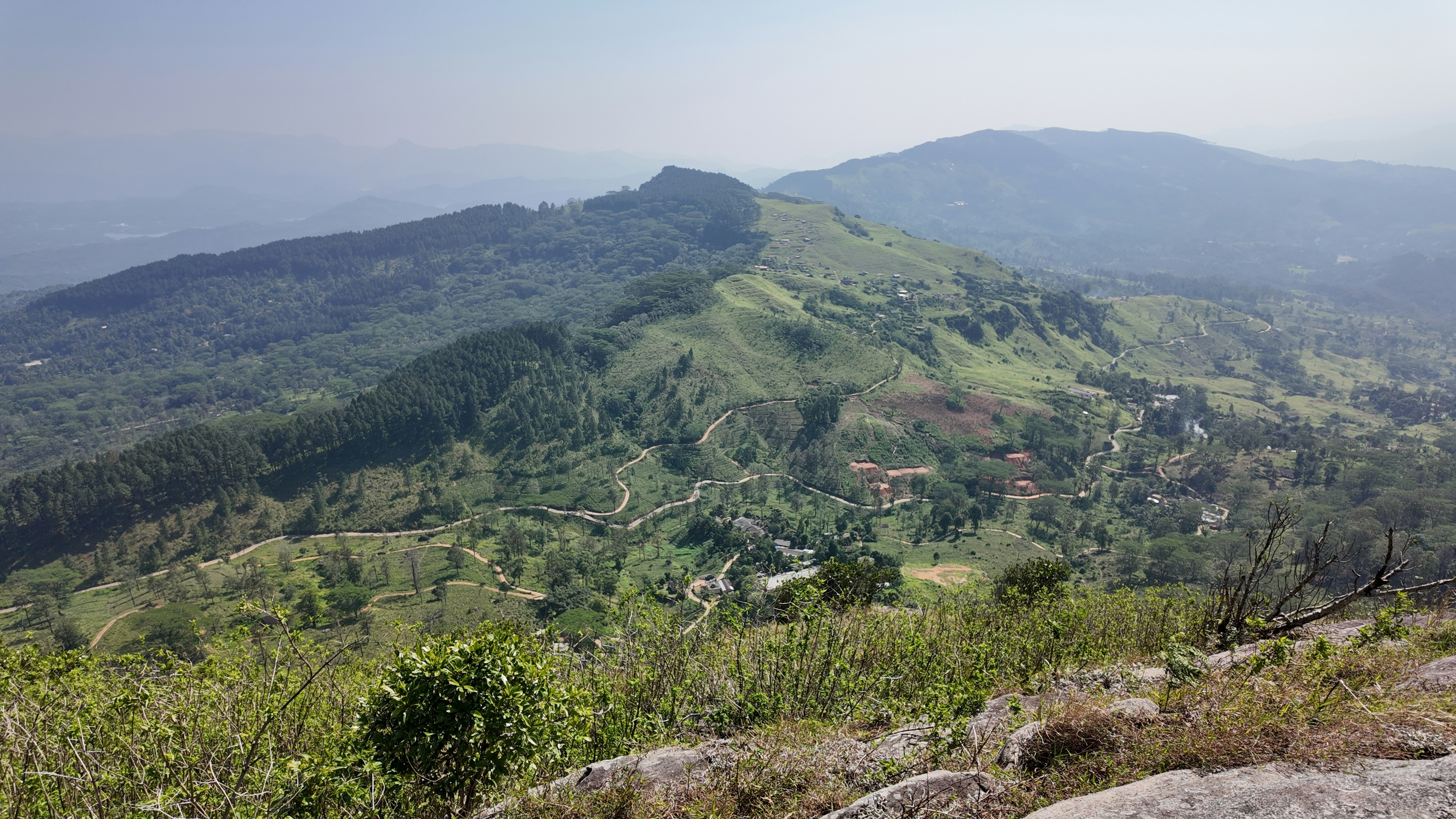 A view of a mountain range with a valley in the distance photo – Free ...