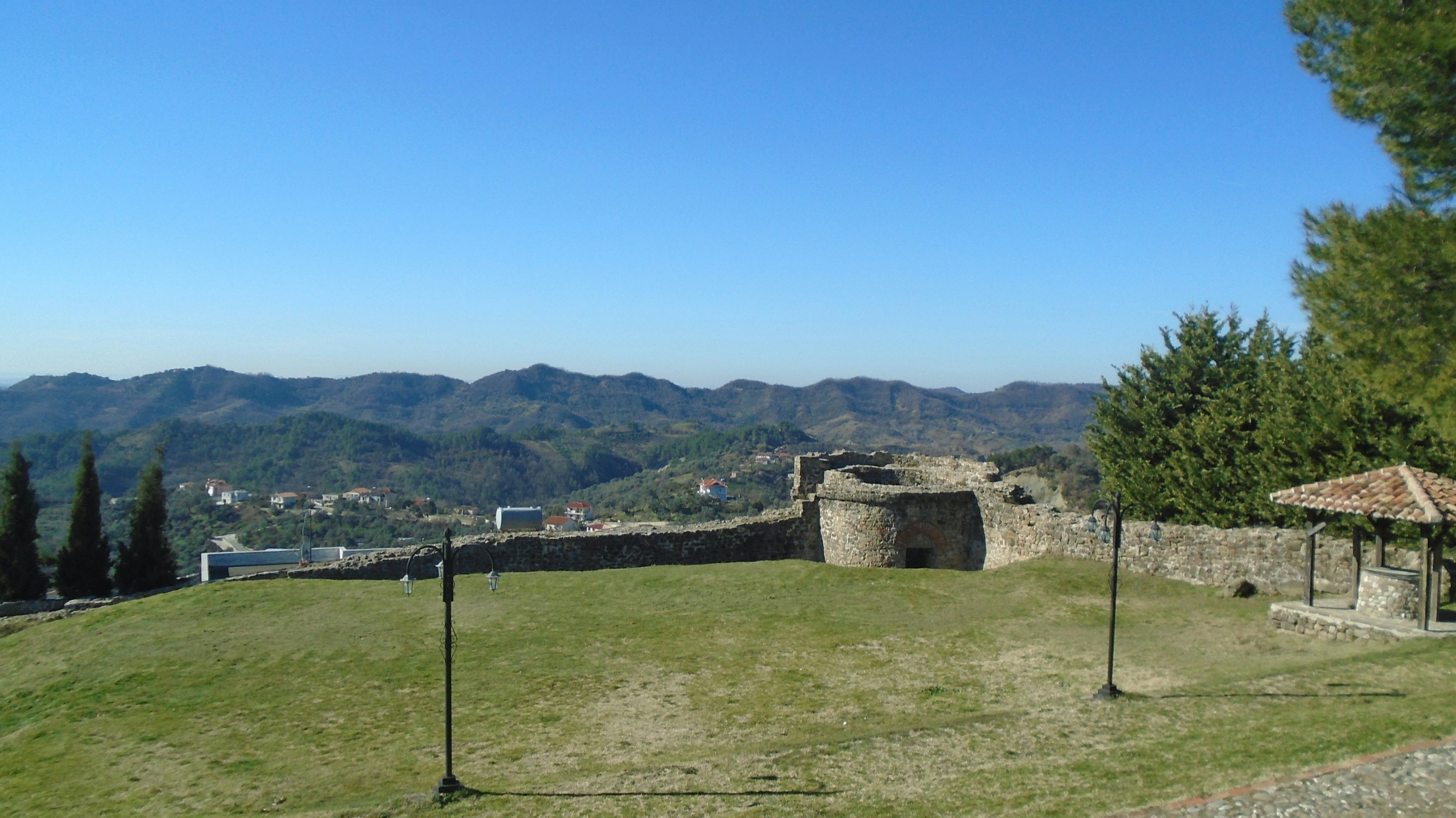 Stone Walled Outpost Over Valleys: A Quiet Hilltop Scene
