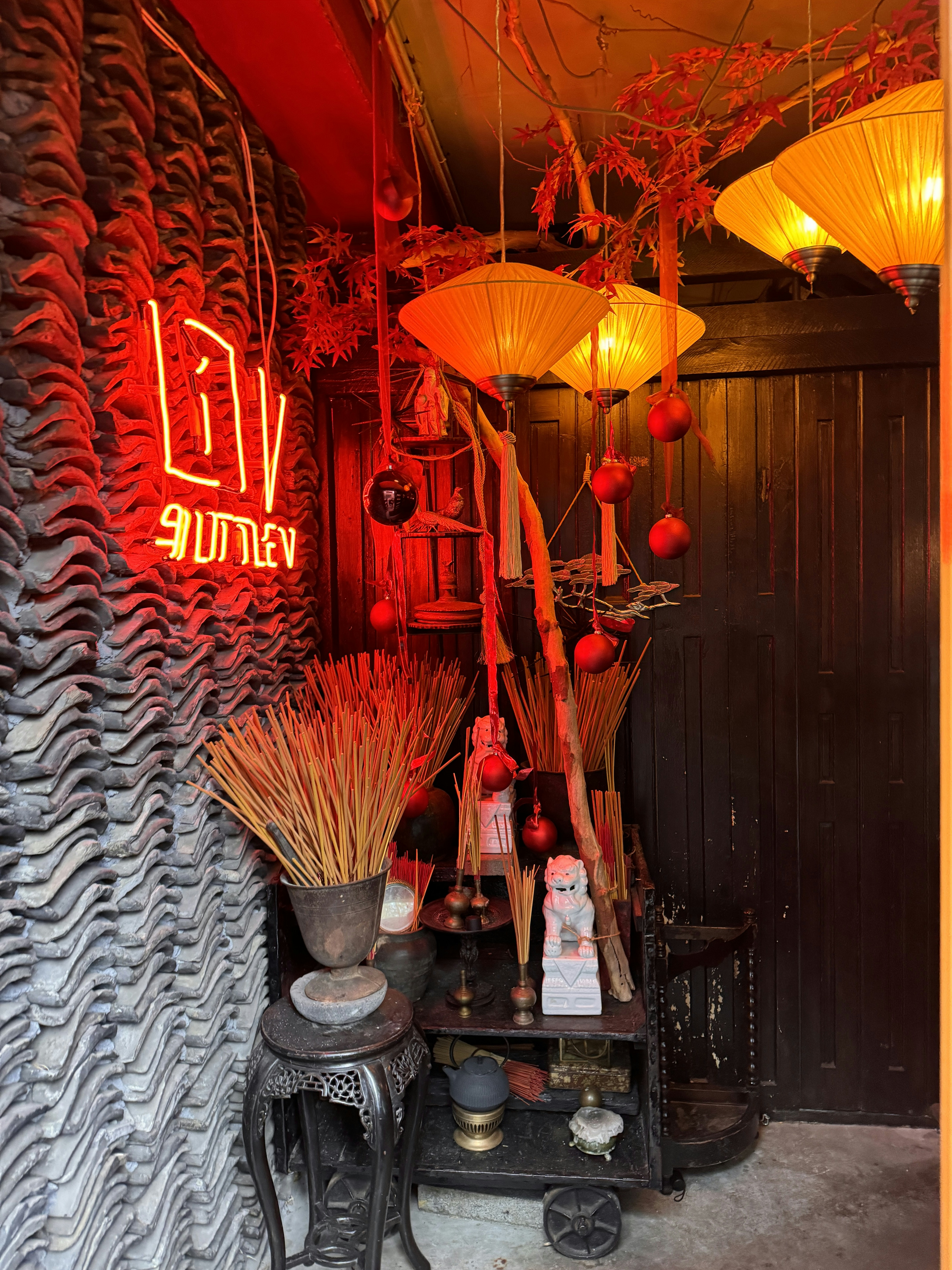 Red Neon Shrine Corner: Incense, Lanterns, and a Maneki-neko