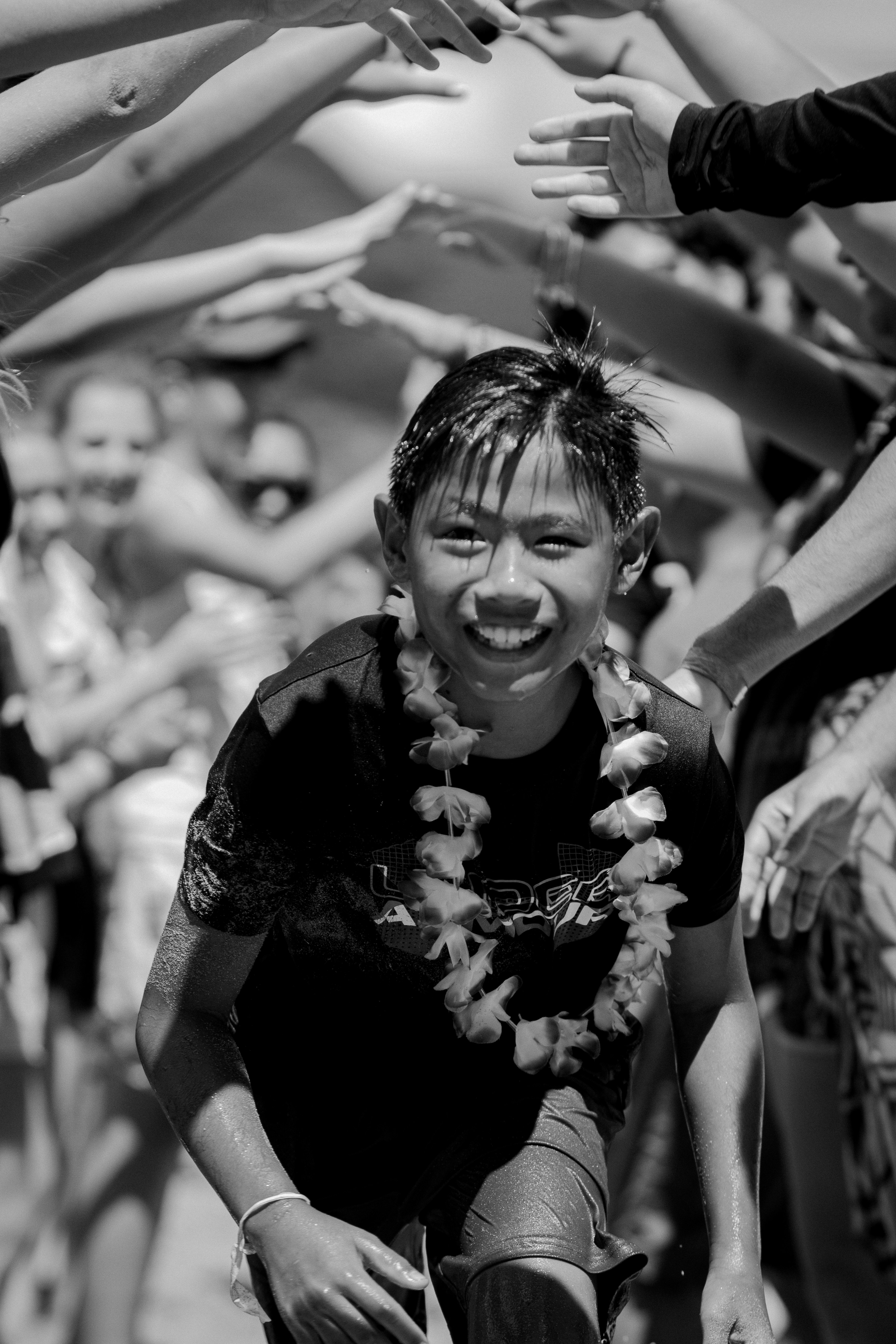 Joyful Run Through a Sea of Hands