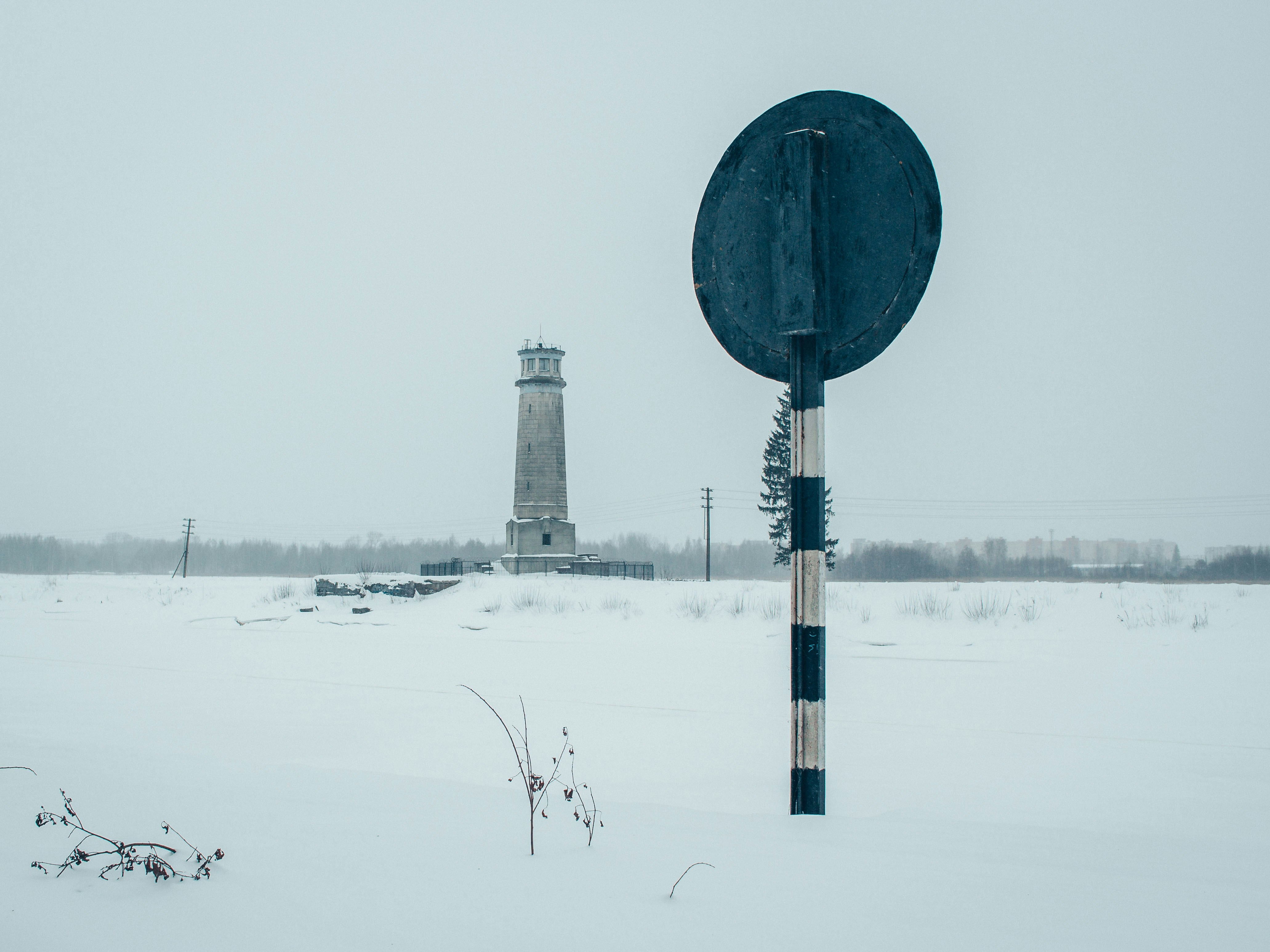 Snowbound Sentinel: A Lighthouse on a Quiet Snowfield