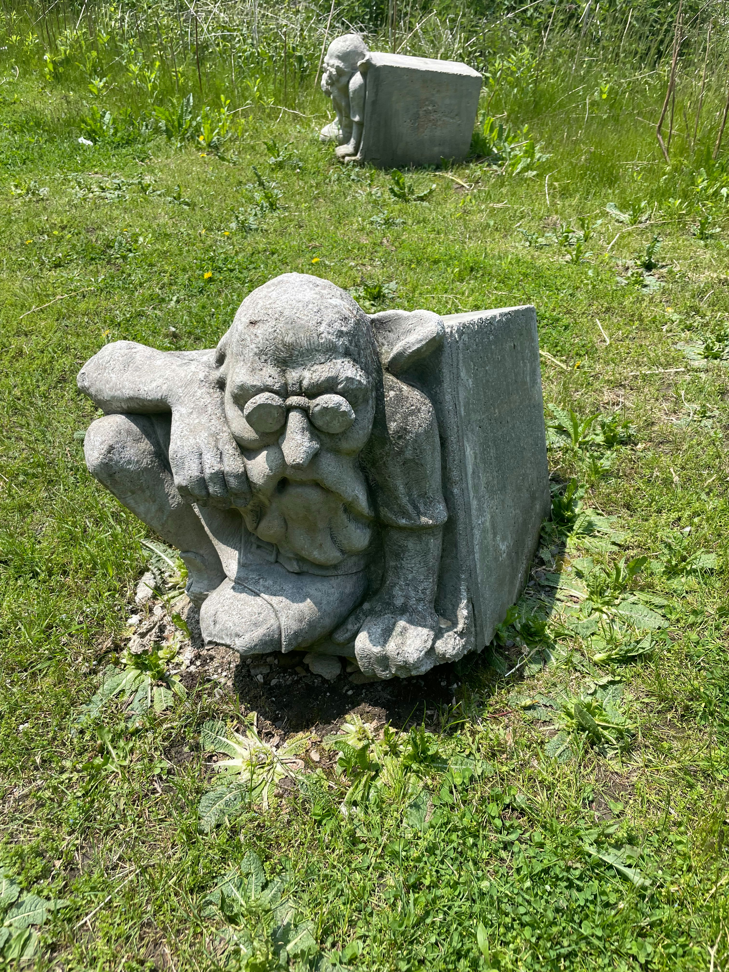 Grounded Gnome: Weathered Stone Keeper Surrounded by Spring Grass