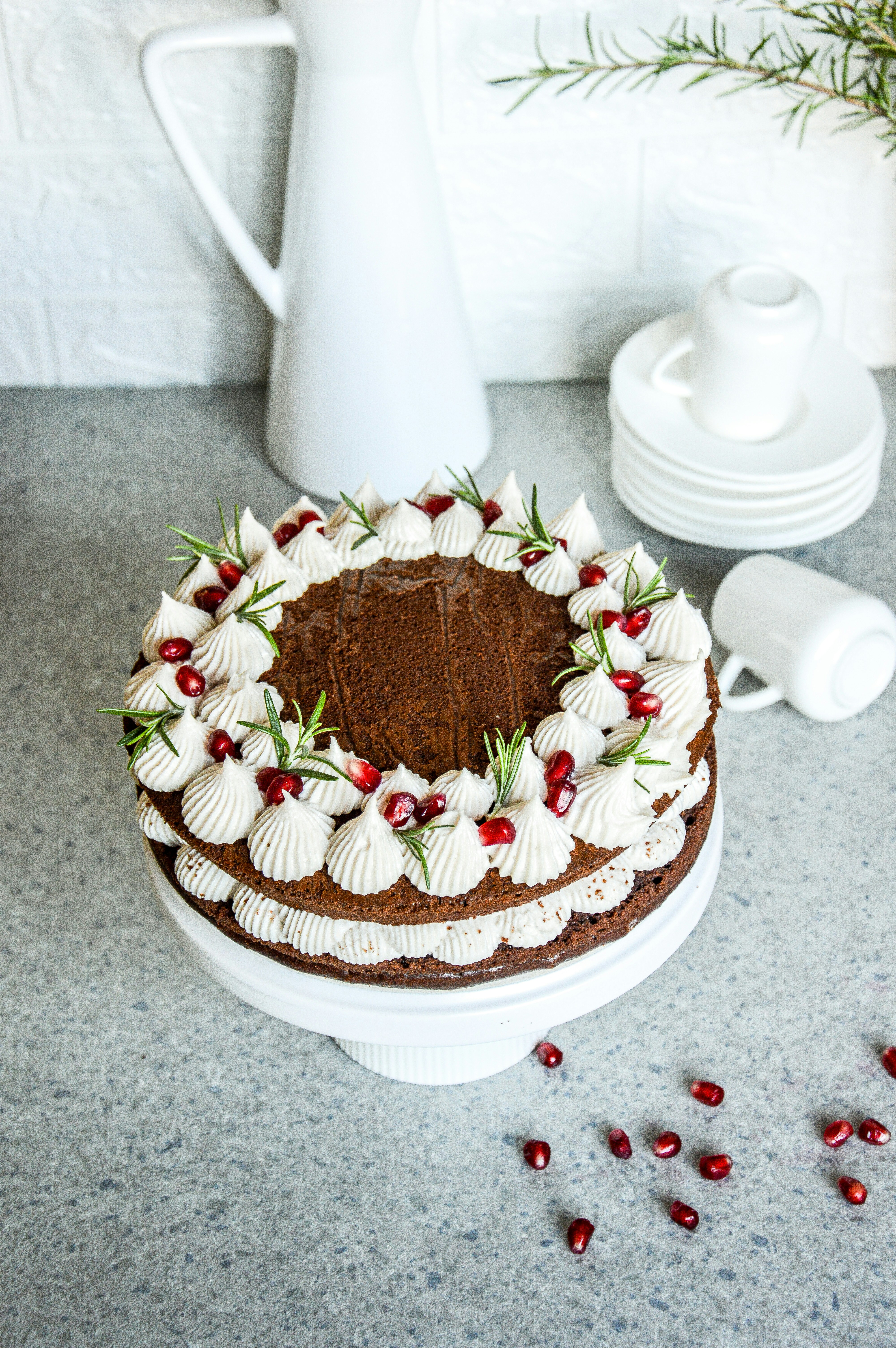 A chocolate cake with white frosting and cranberries photo – Free Food ...