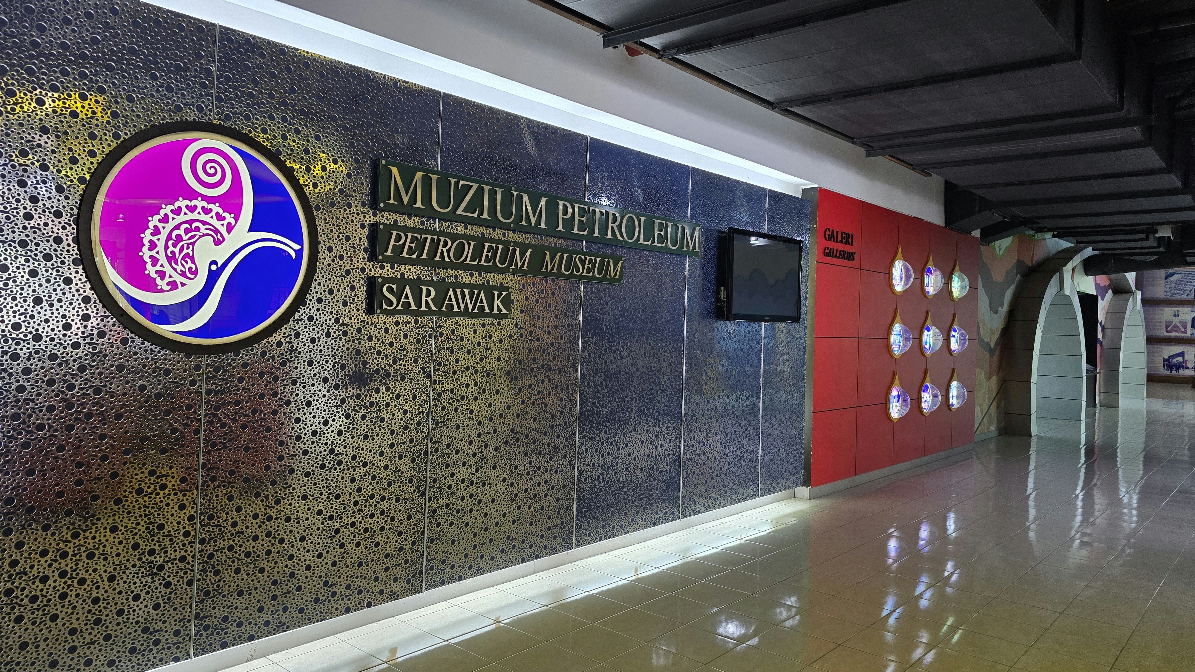 A sign on a wall in a building photo – Free Miri Image on Unsplash