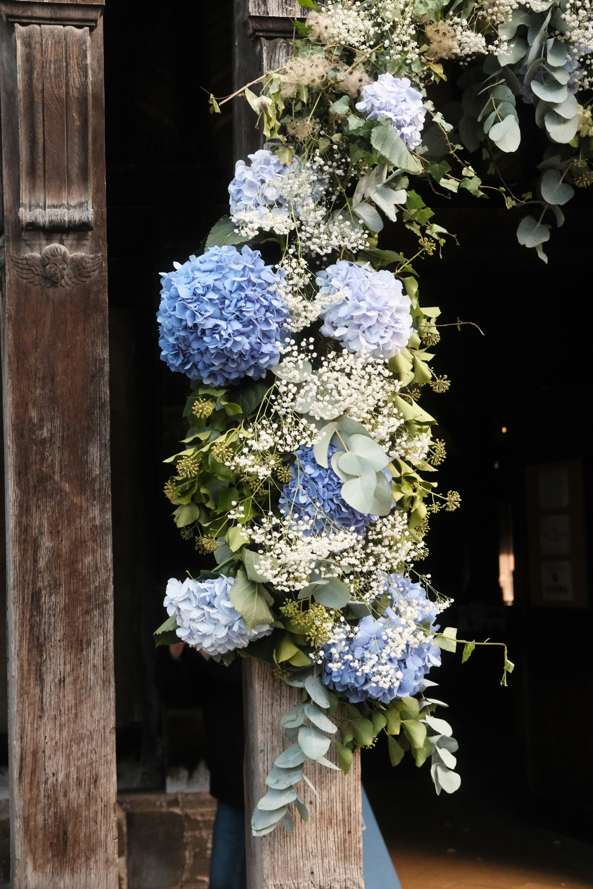 Blue Hydrangea Cascade at a Weathered Doorway