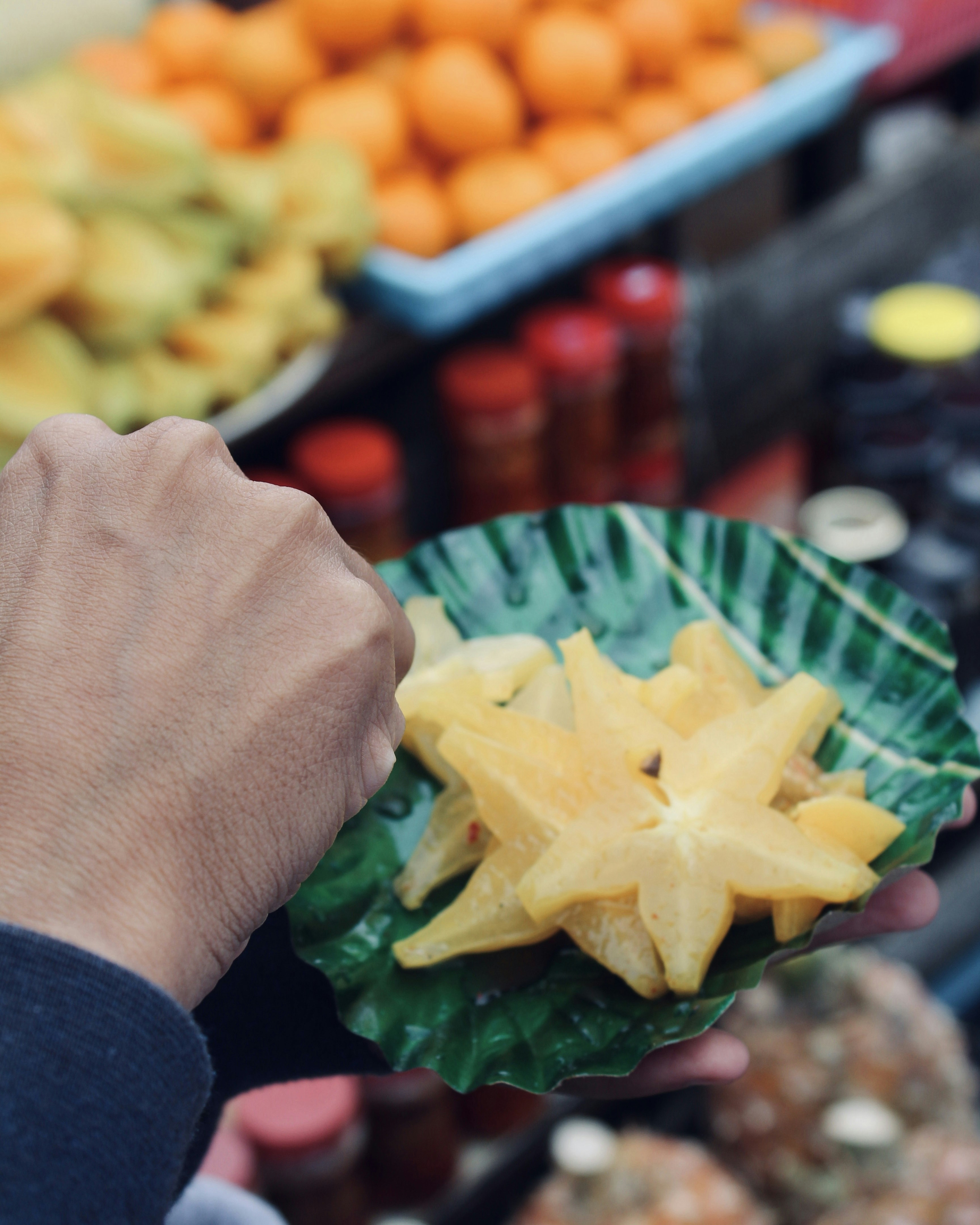 Starfruit Crescents in a Market Handheld Snack Moment