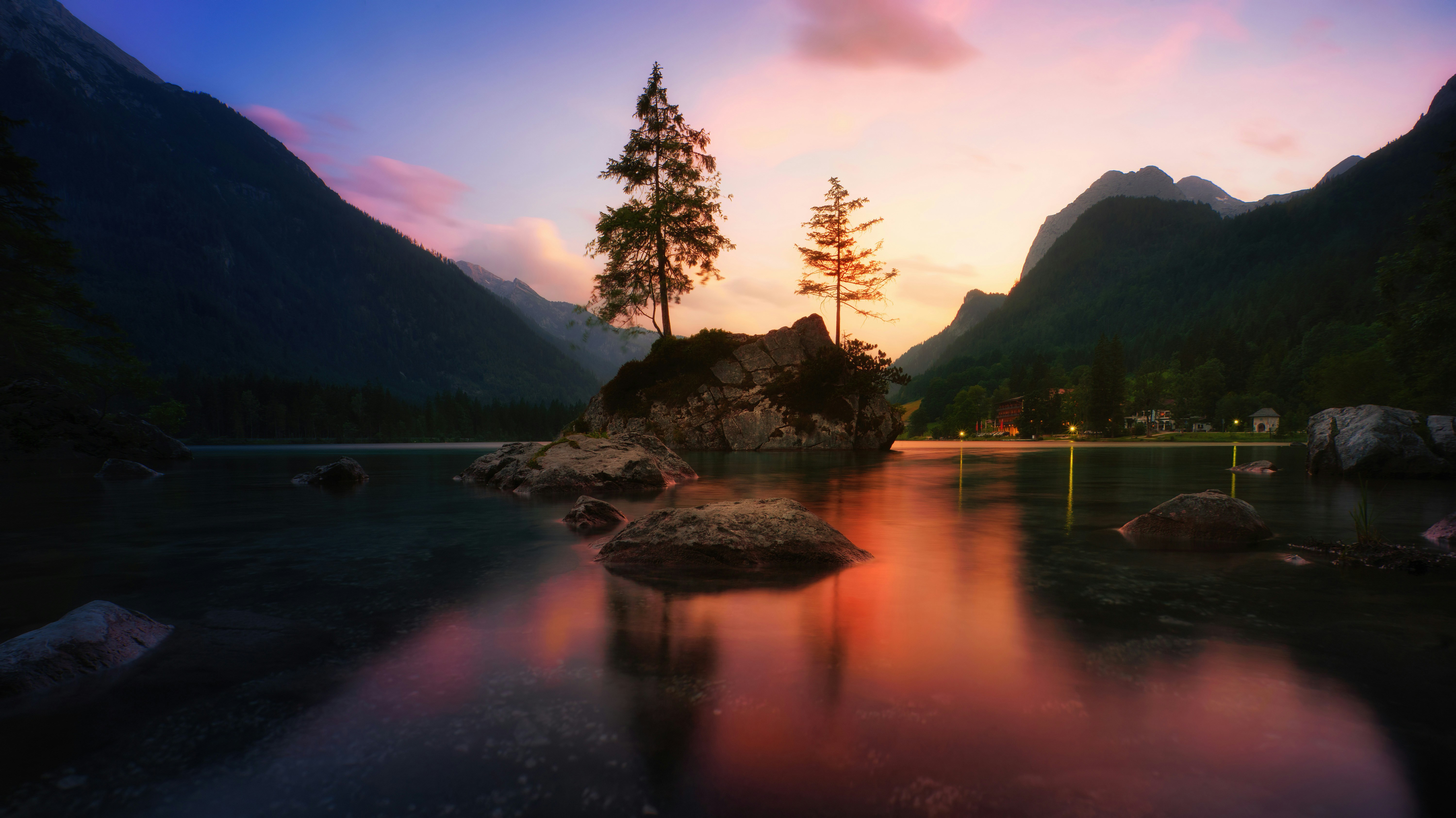 A lake surrounded by mountains and trees at sunset photo – Free Scenery ...