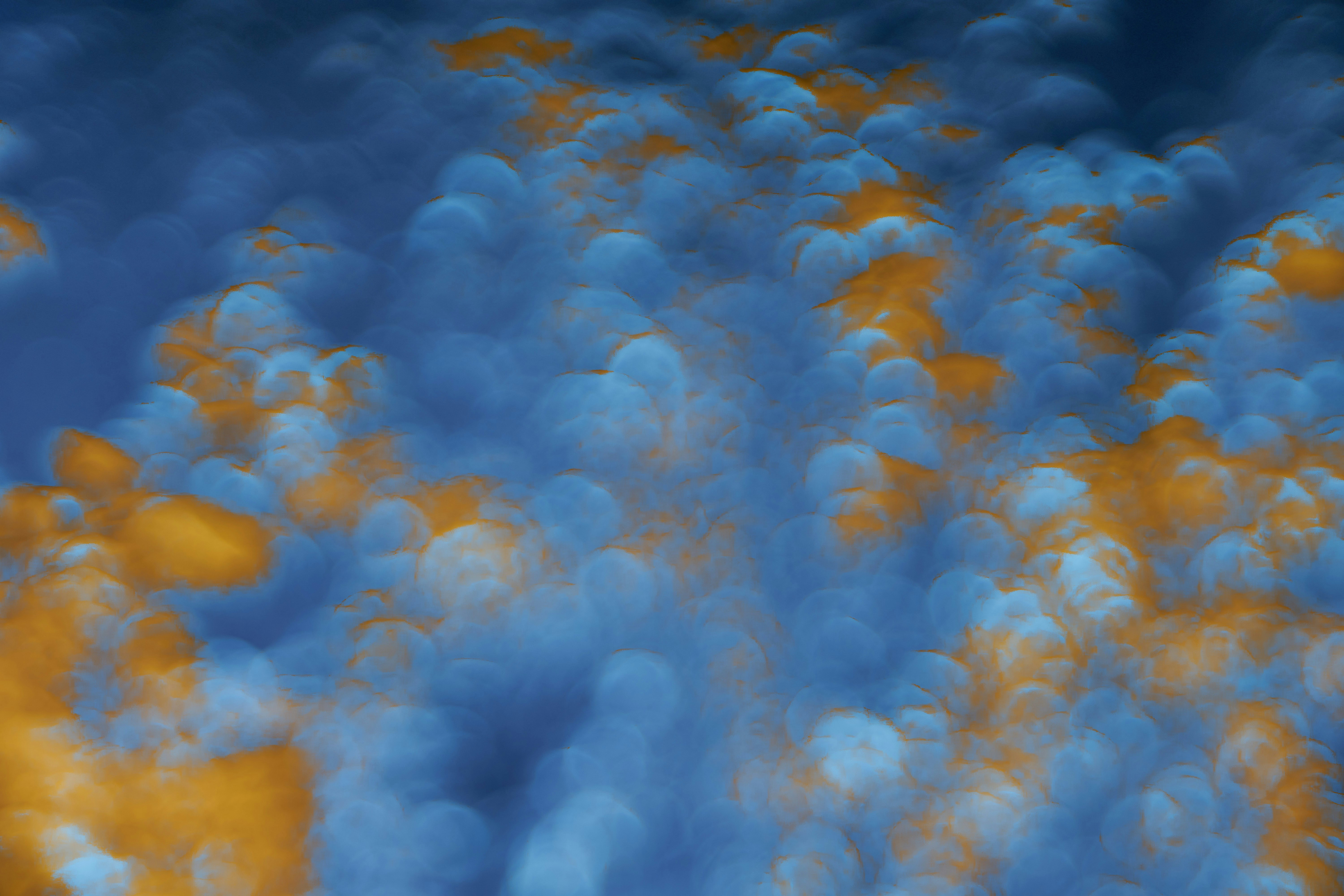 Velvet Currents Over a Cyan-Orange Sky