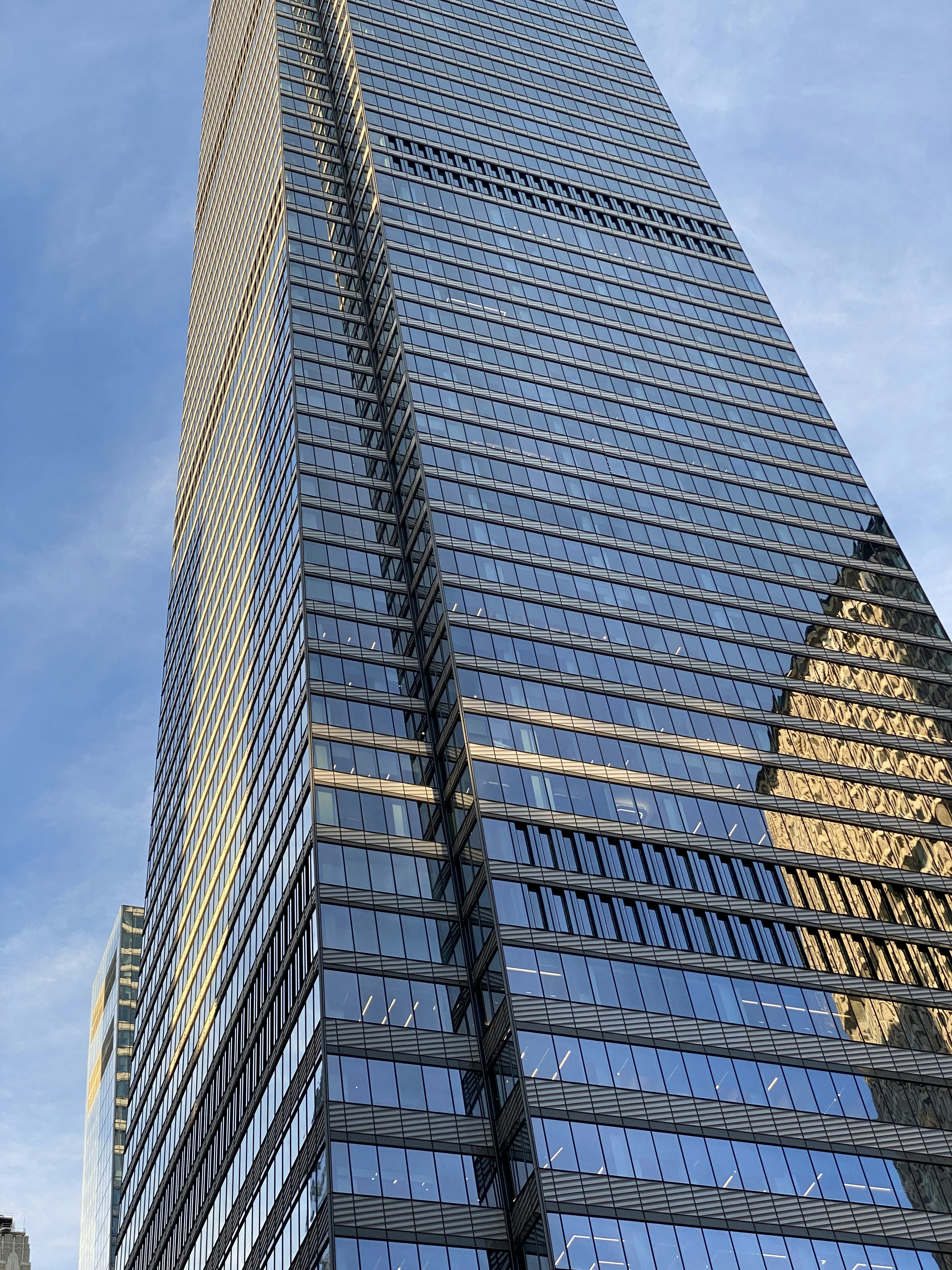 A very tall building with a lot of windows photo – Free Midtown ...