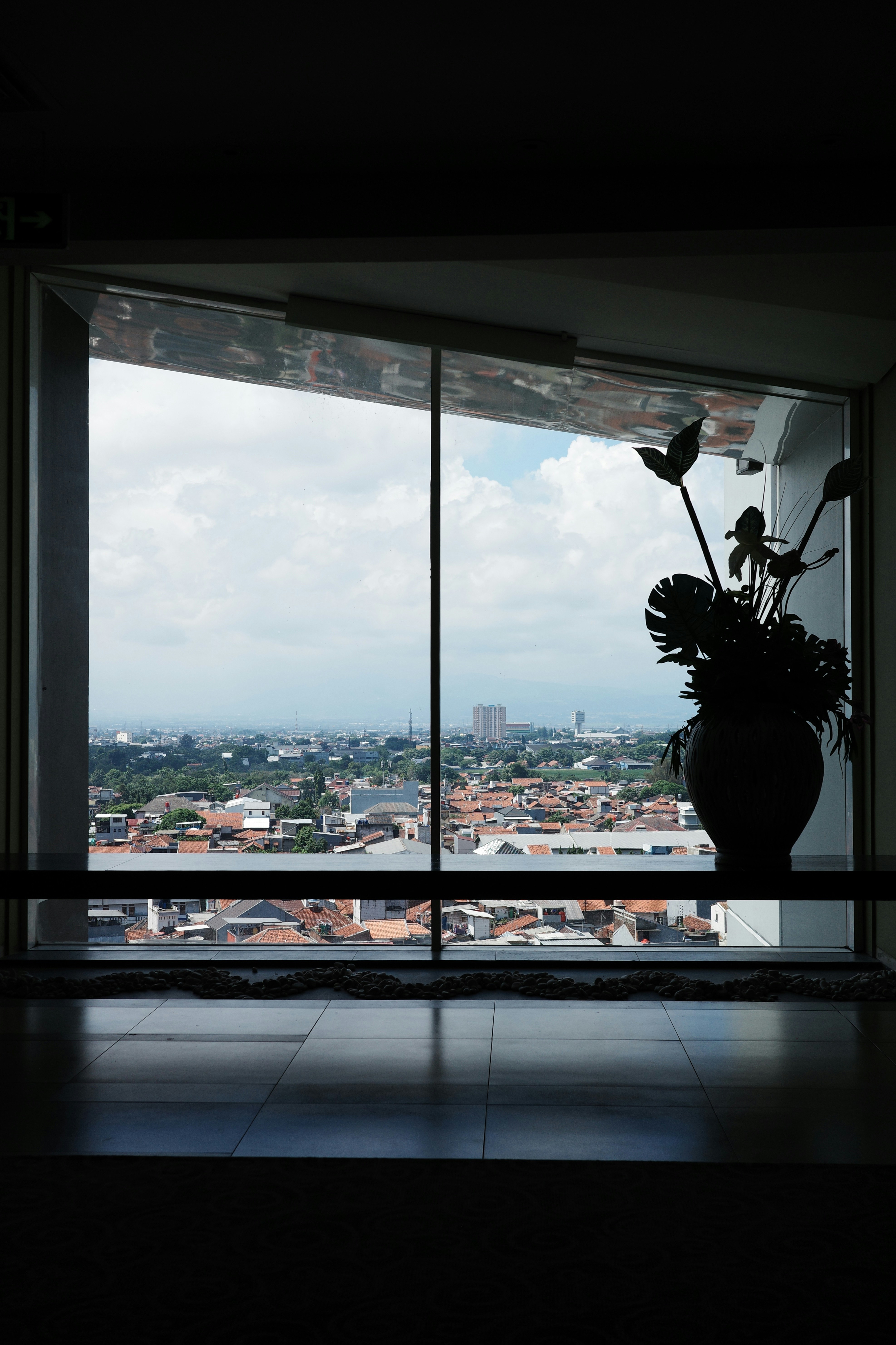 Hotel window facing the city.