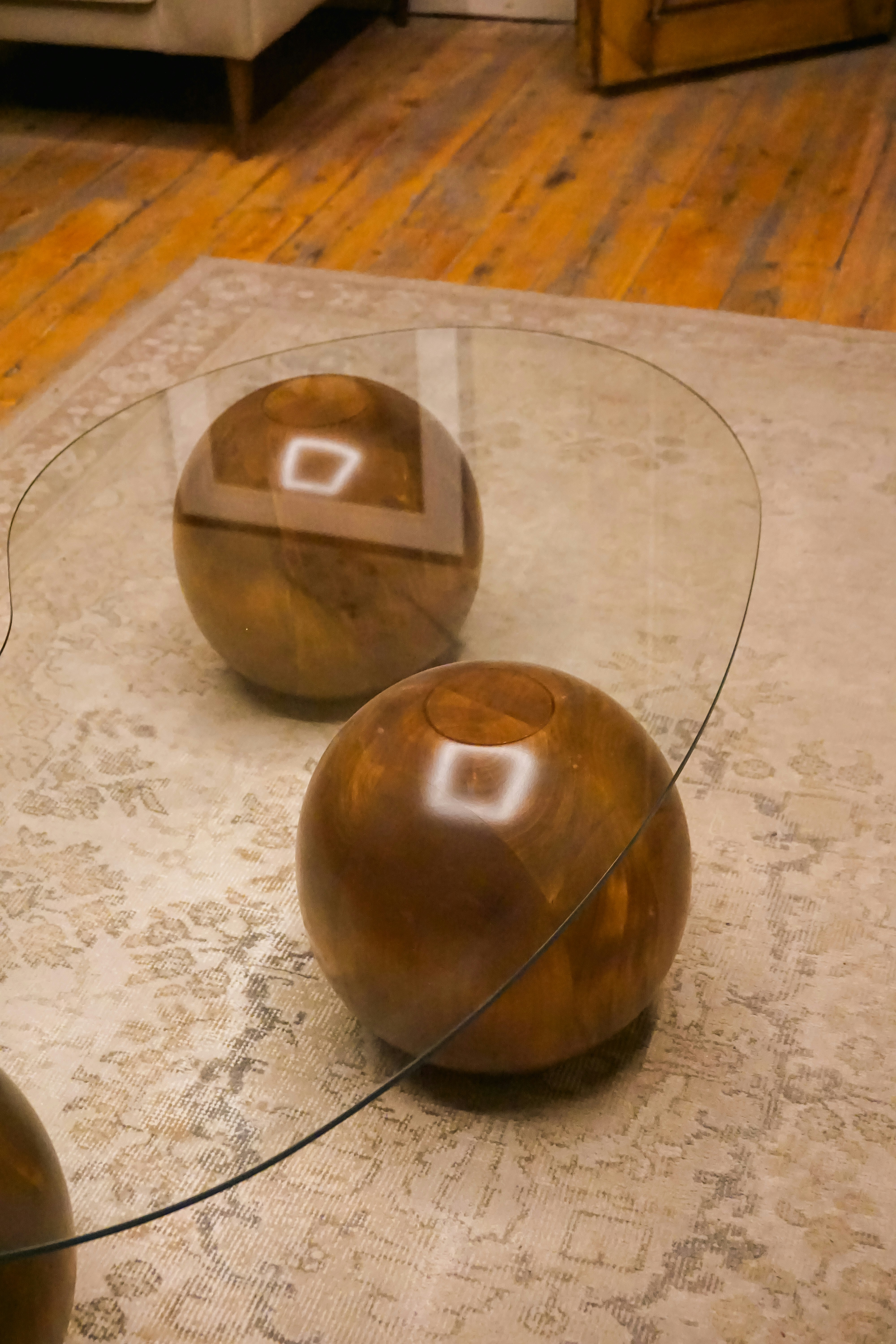 Curved Glass, Round Orbs: A Quiet Still-Life
