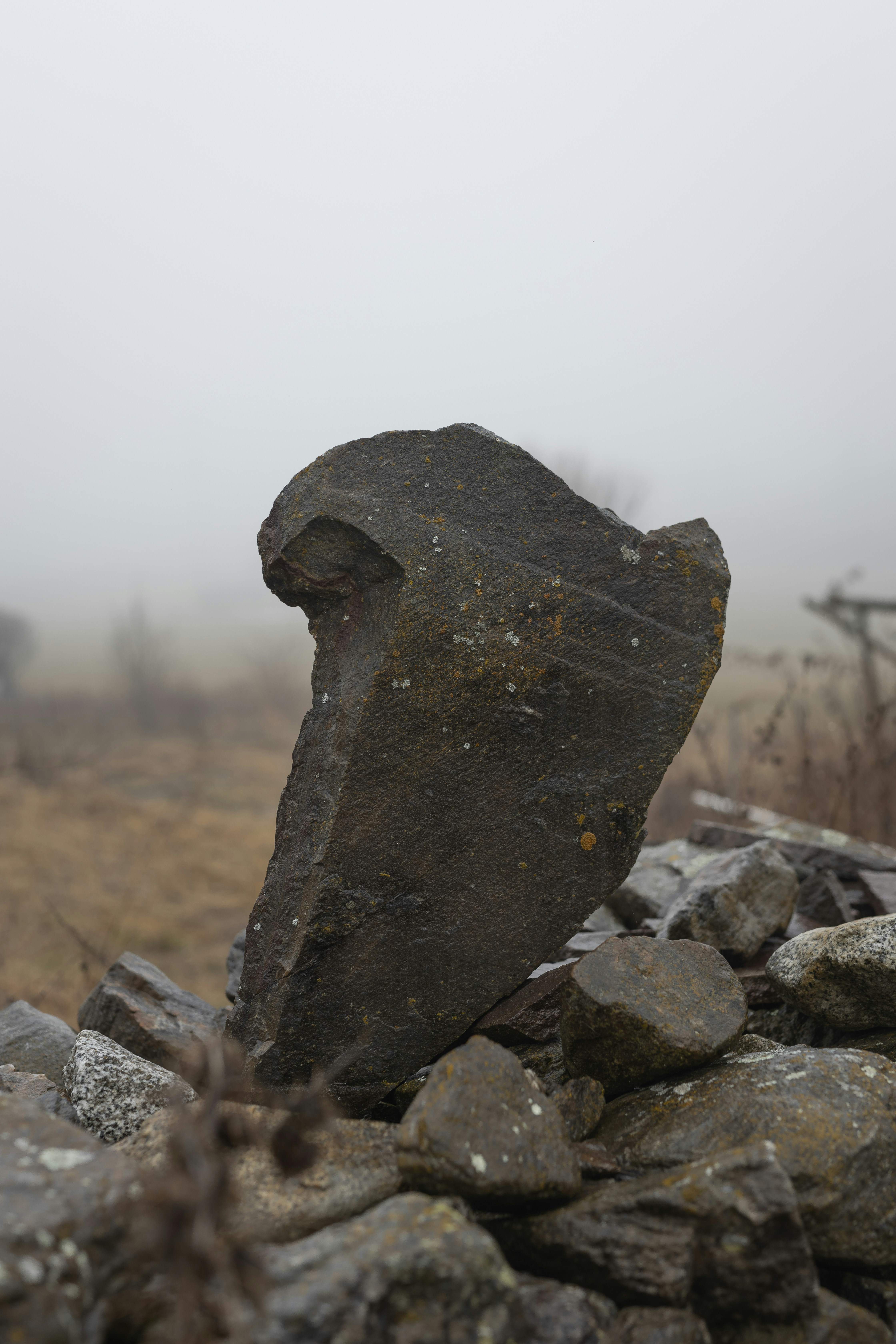 A large rock sitting on top of a pile of rocks photo – Free Rock Image ...