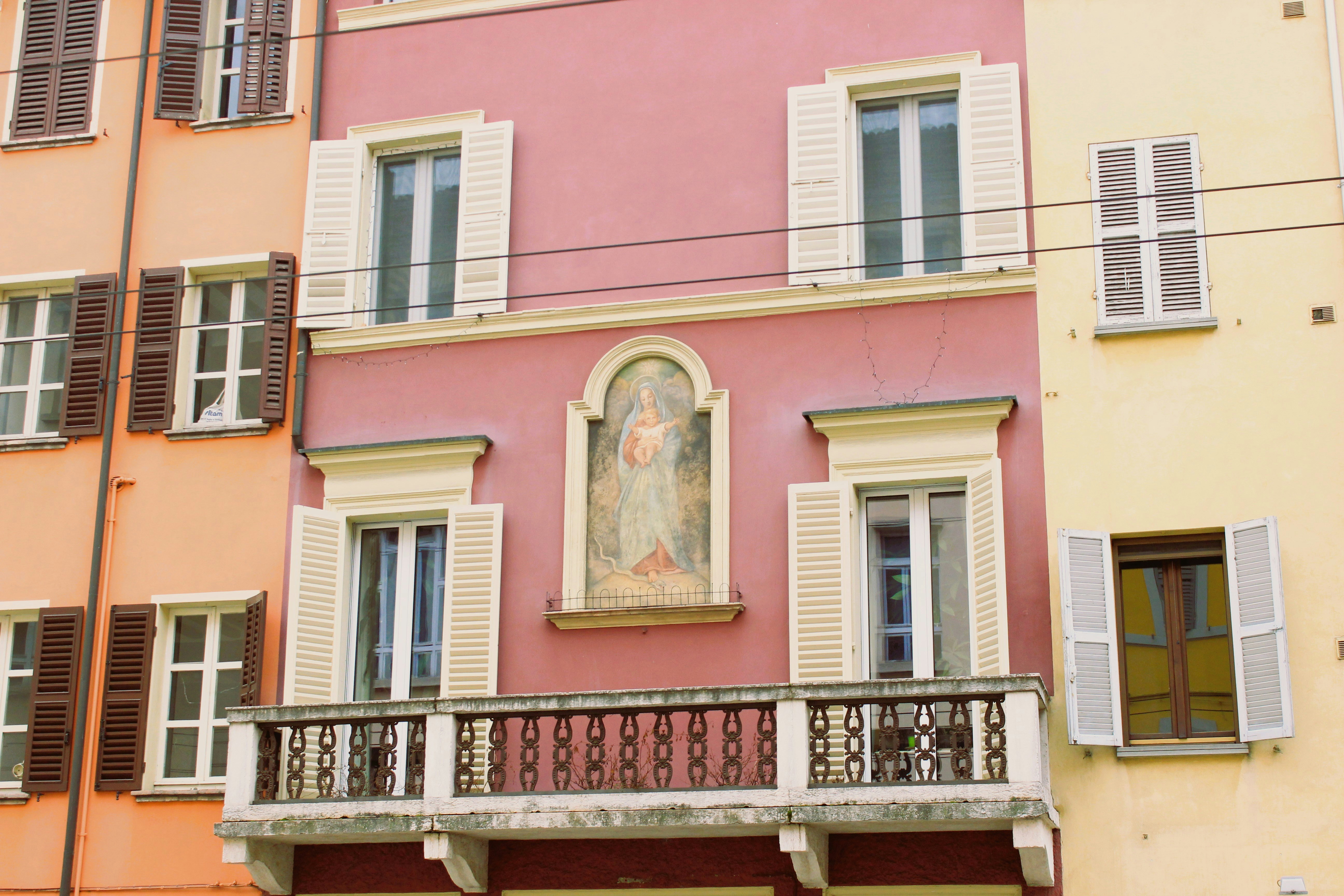 Pastel Shrine: Madonna in a Central Pink Facade