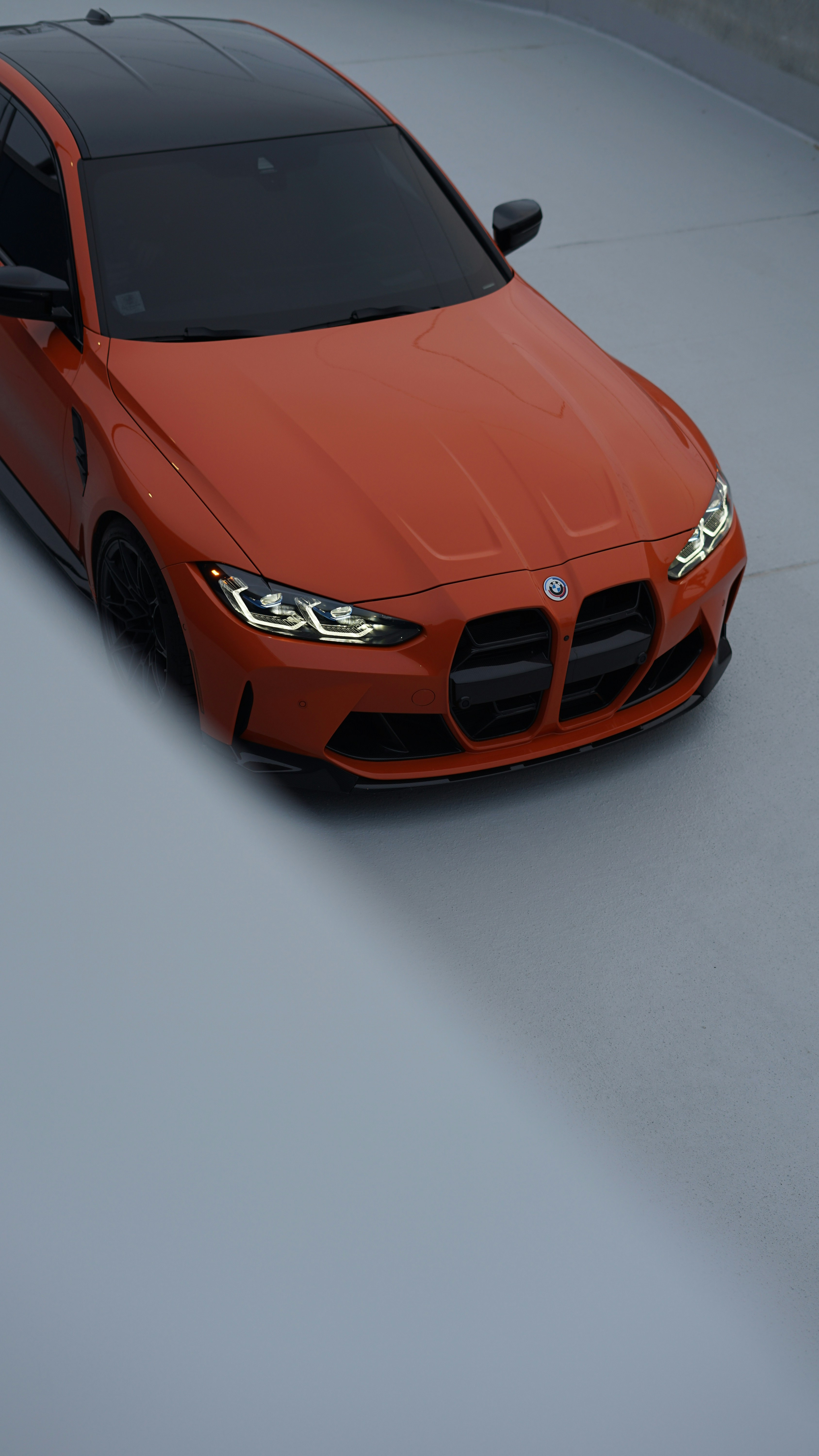Crimson Aggression: Front-Quarter View of a Bold Sports Coupe