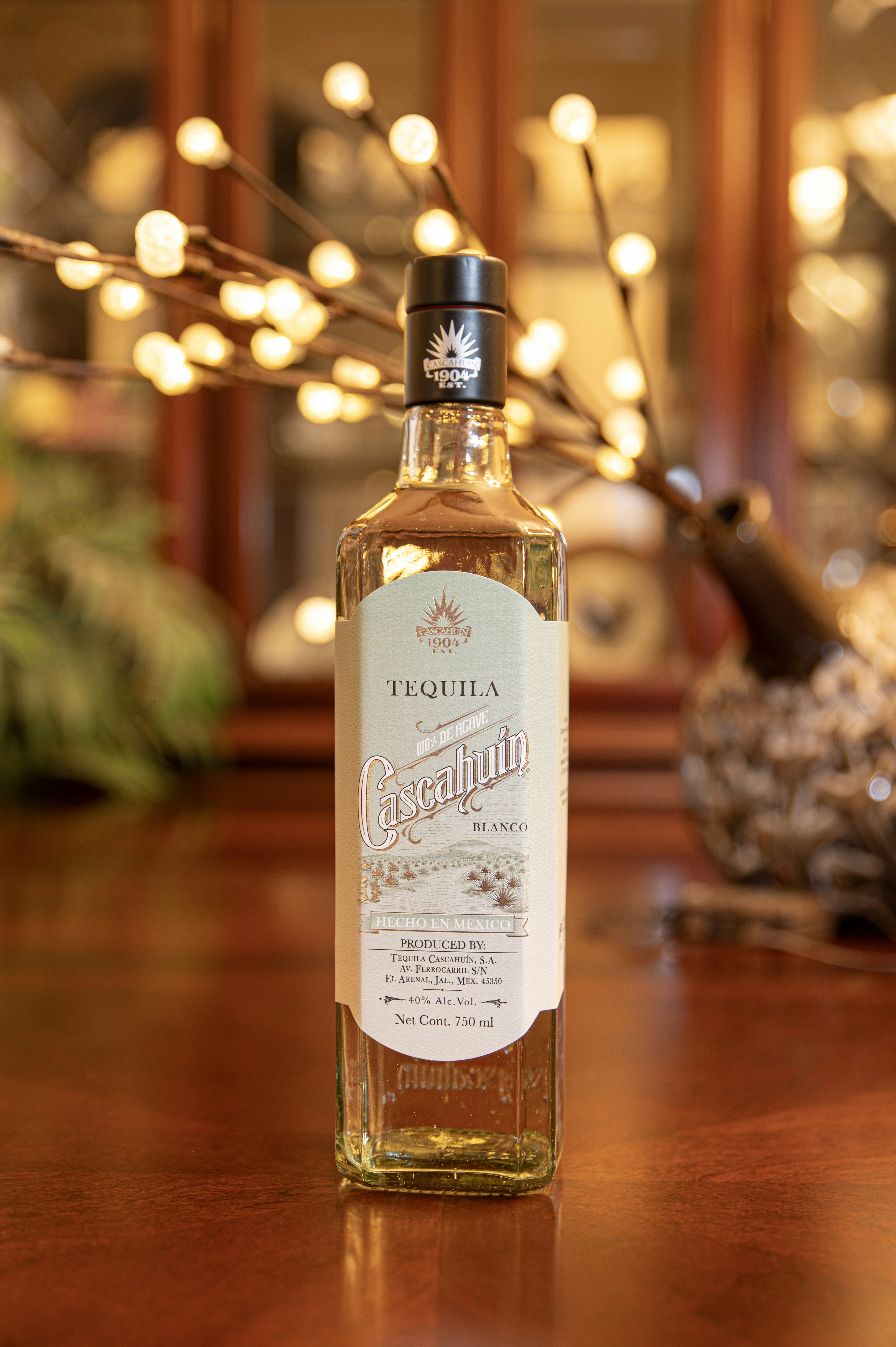 Tequila in Focus: A Centred Bottleneck on a Warm Bar Counter