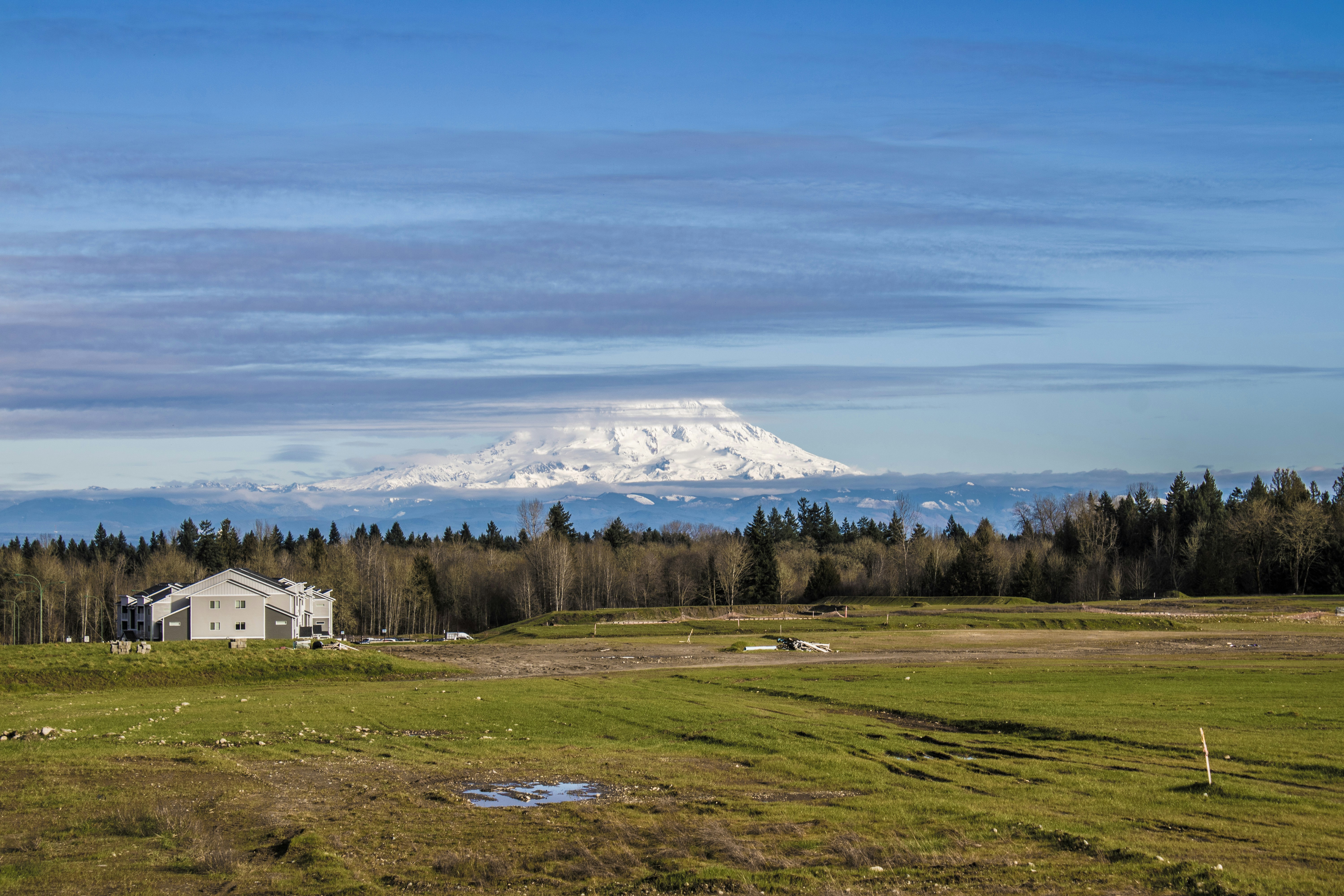 Snow-crowned peak on a tranquil frontier