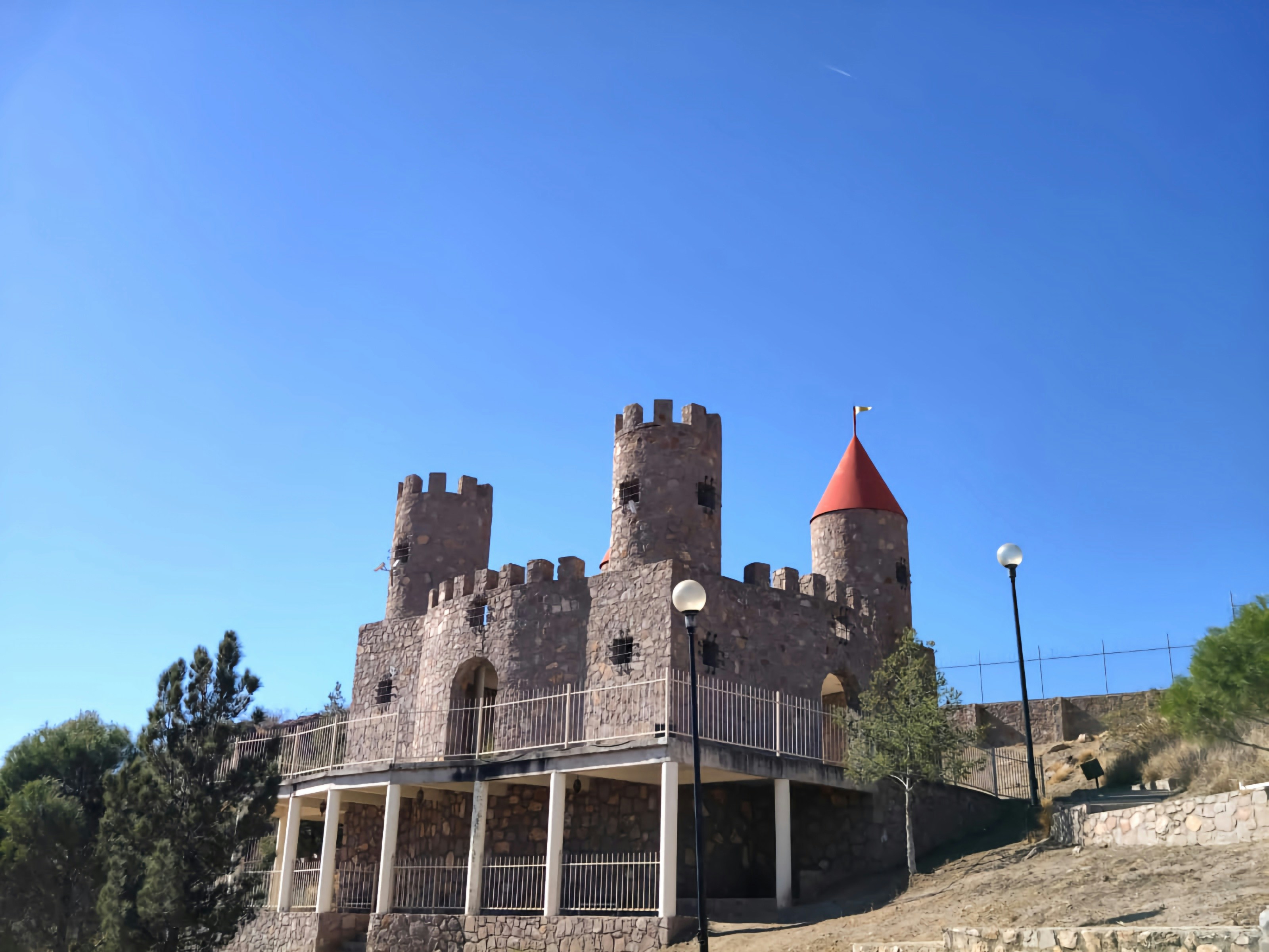A castle like building with a red roof photo – Free Building Image on ...